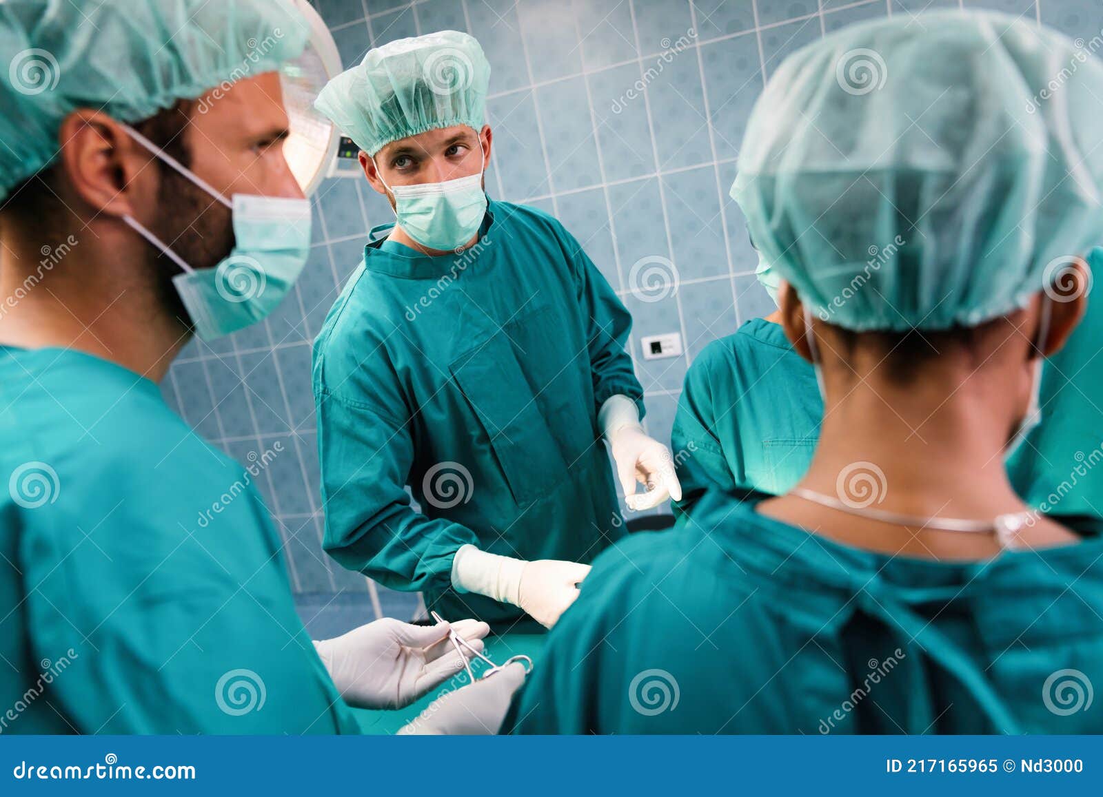 Team of Surgeons in the Operating Room Preparing for Surgery Stock ...
