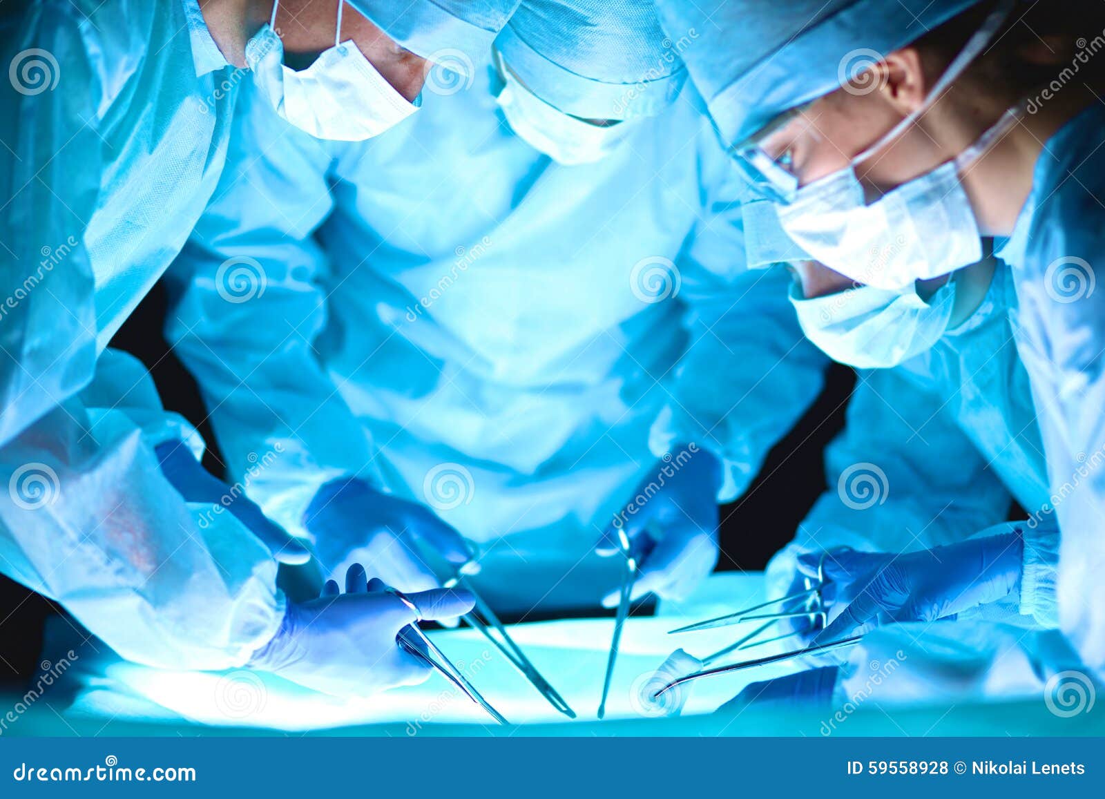 A Team of Surgeons at Work in the Operating Room Stock Photo - Image of ...