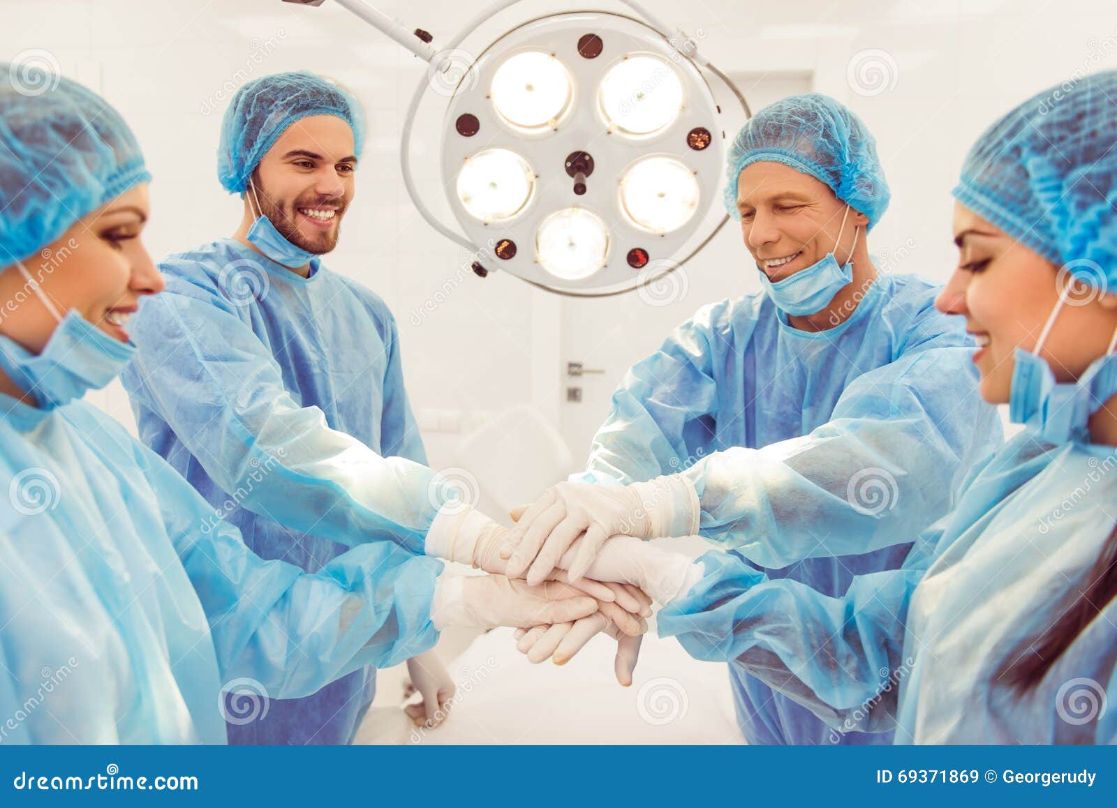 Team surgeons at work stock image. Image of lifestyle - 69371869