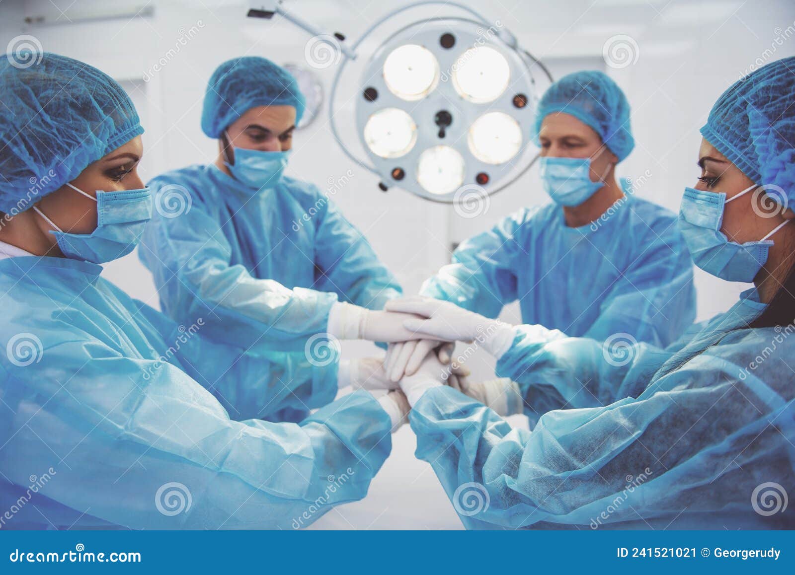 Team surgeons at work stock image. Image of collaborative - 241521021