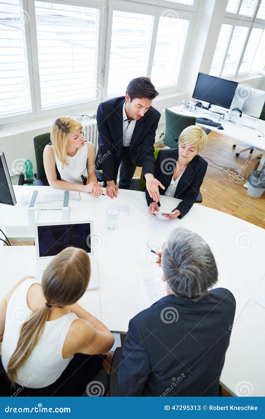 Team Talking in Business Meeting at Conference Table Stock Image ...