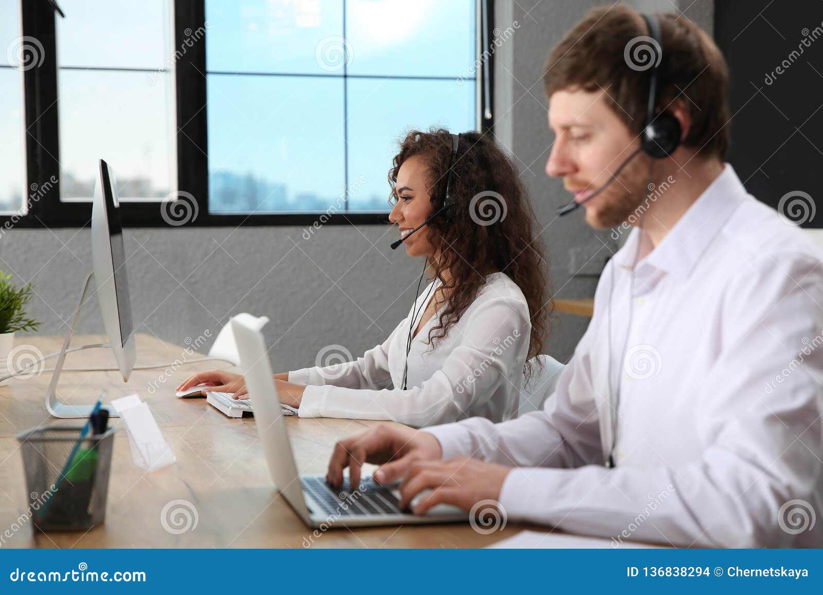 Team of Technical Support with Headsets Stock Photo - Image of ...
