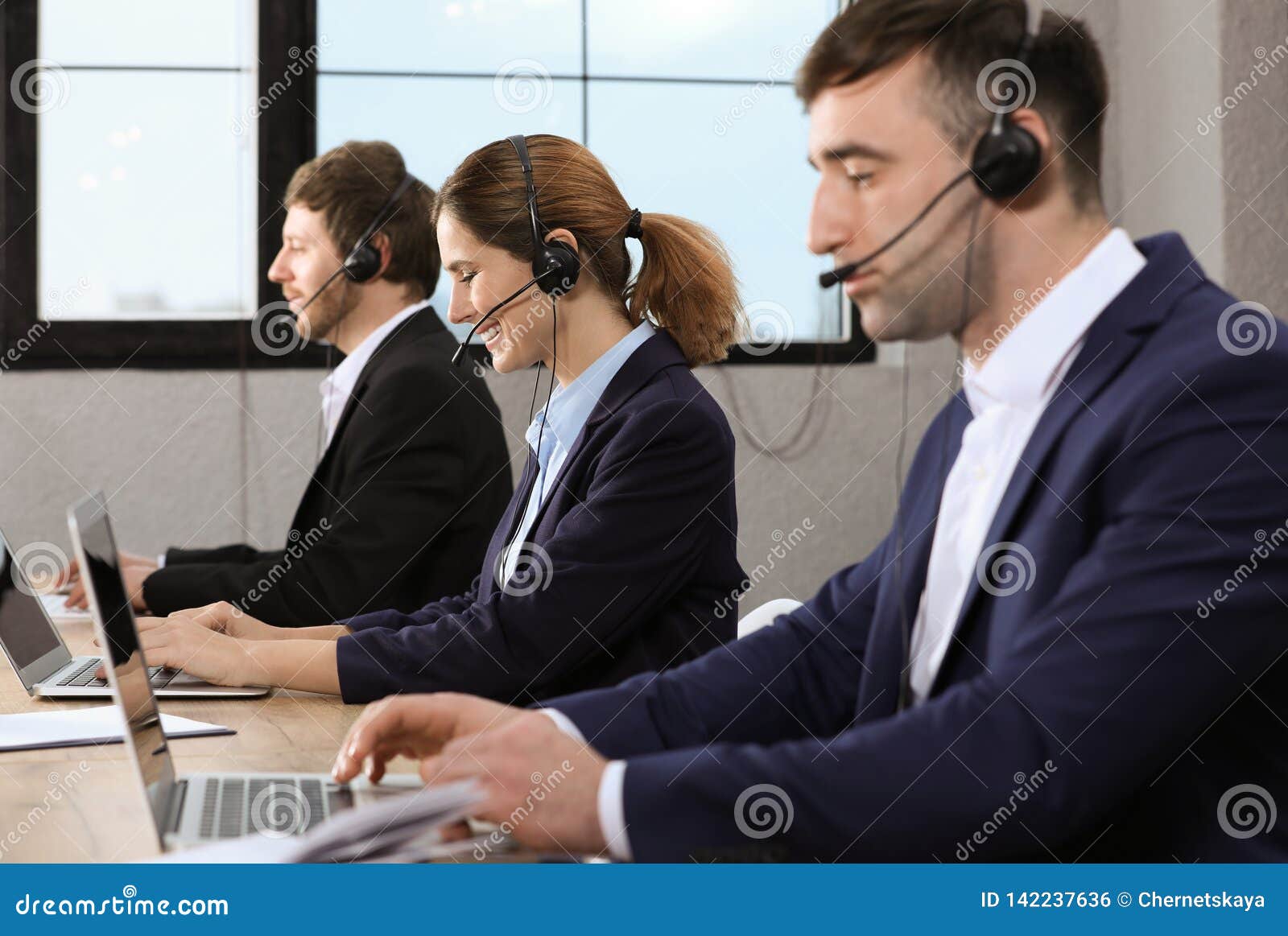 Team of Technical Support with Headsets Stock Photo - Image of device ...