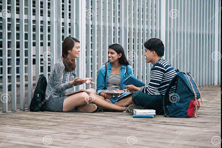 Team of teens stock photo. Image of sitting, studying - 54891214