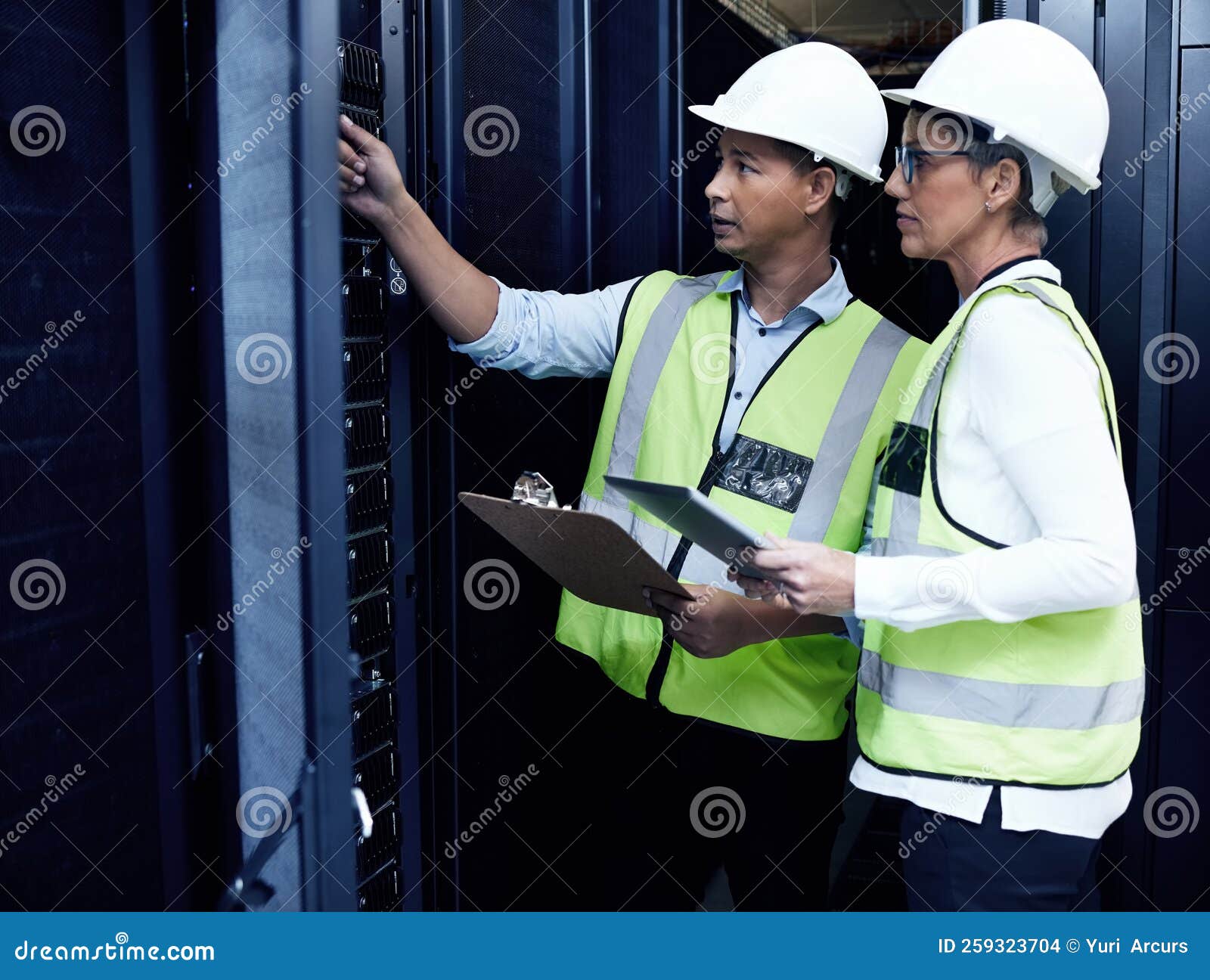 The Team To Call for Your Connectivity Concerns. Two Technicians ...