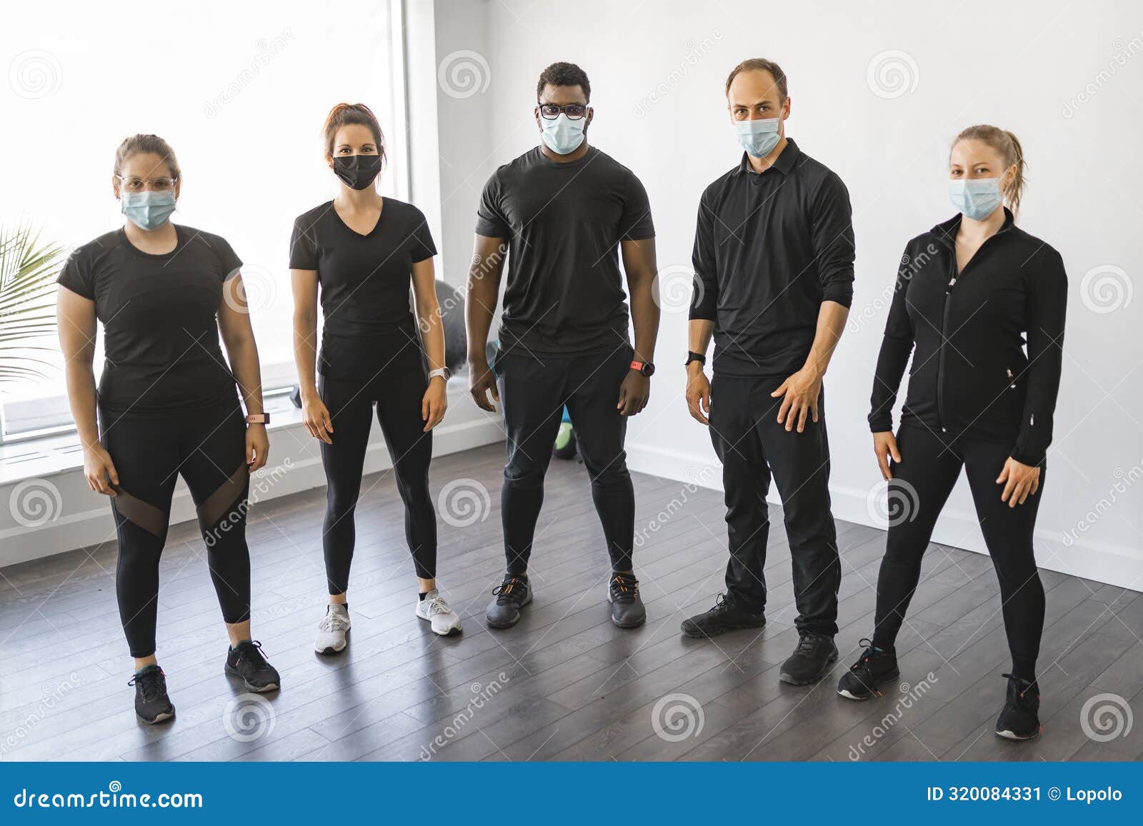 Team of Trainer Standing with a Smile in the Training Gym Stock Image ...