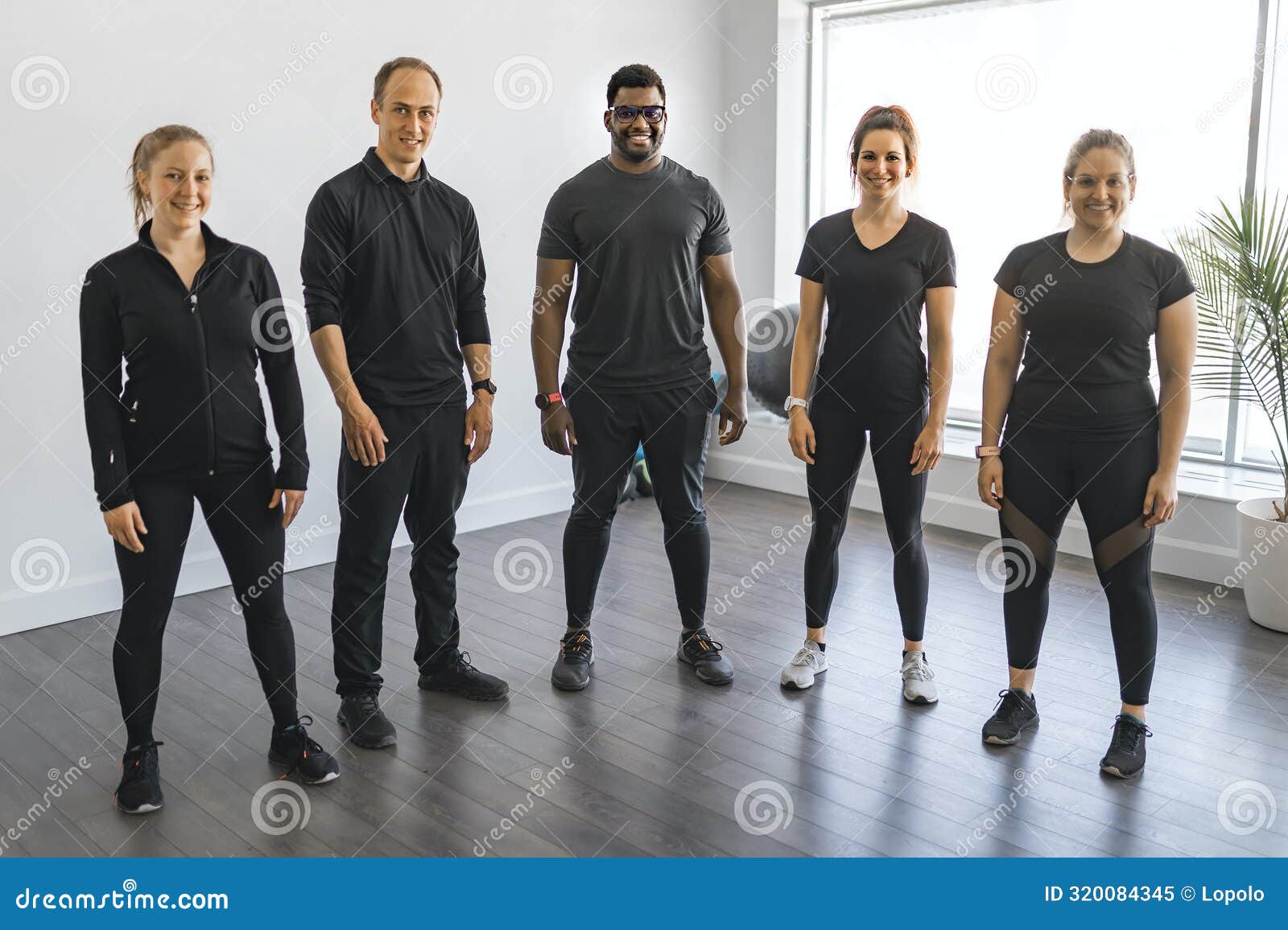 Team of Trainer Standing with a Smile in the Training Gym Stock Image ...