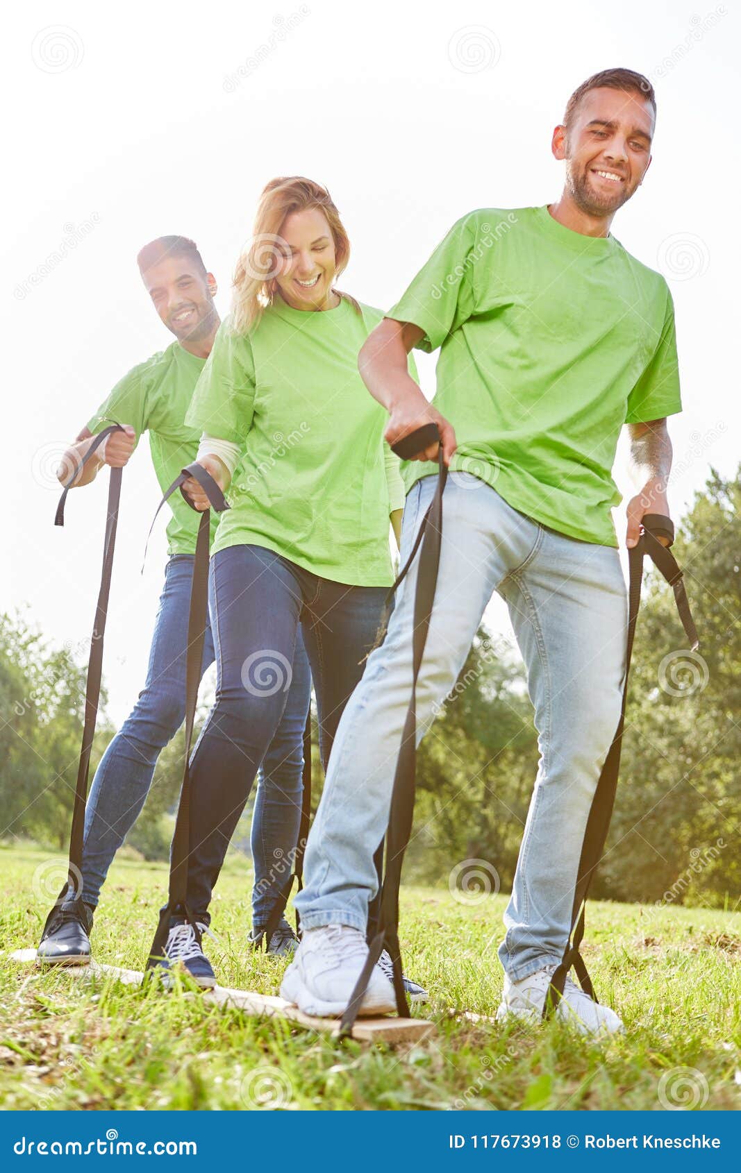 Team is Training Teamwork with the Elastic Band Stock Photo - Image of ...
