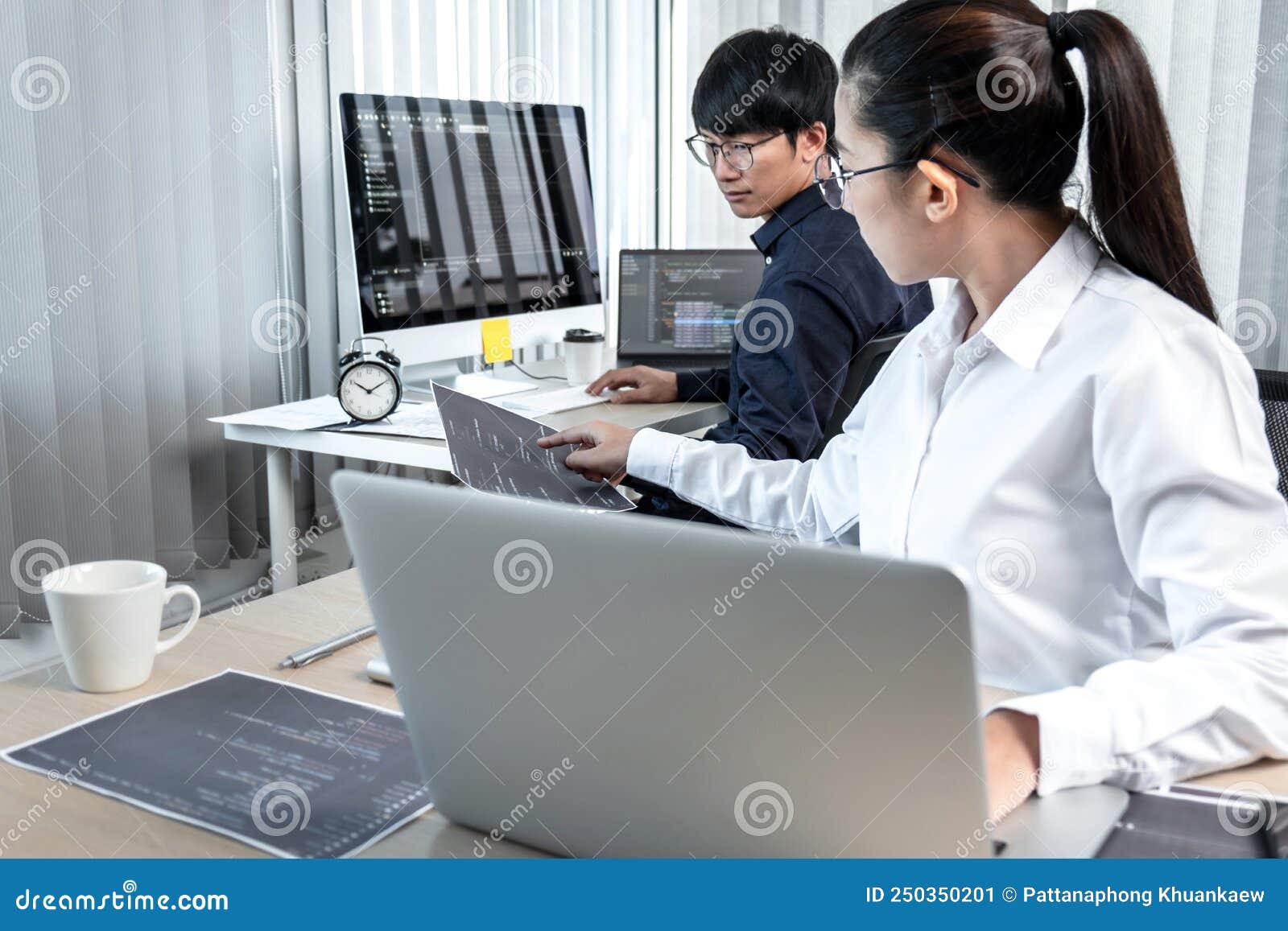 Team of Two Professional Programmers Working on Website Projects in ...