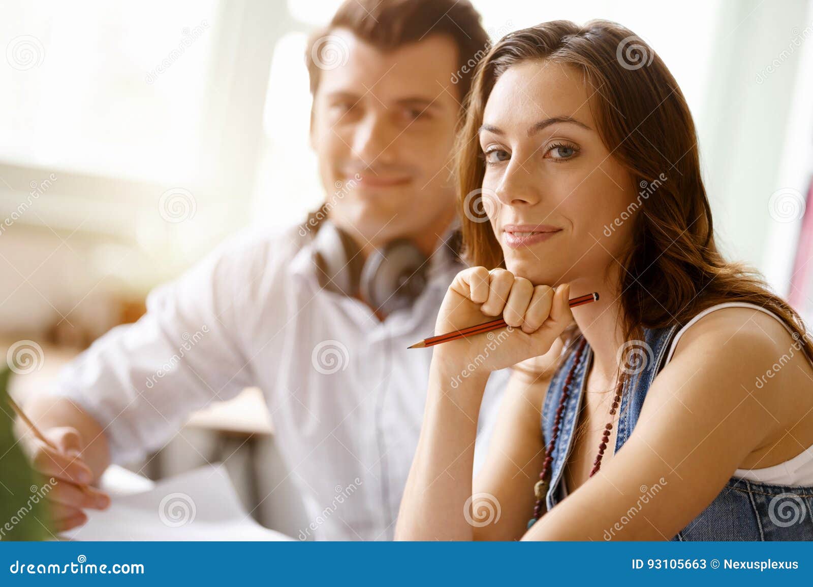 Team of two young people stock image. Image of occupation - 93105663