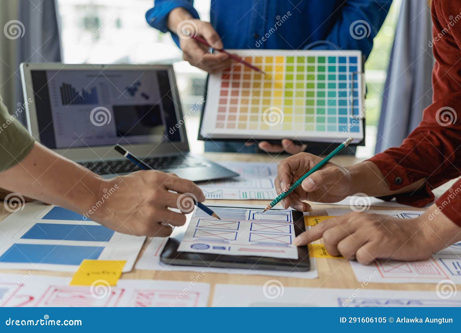 A Team of UI UX Web Designers is Working Together To Develop a Mobile ...