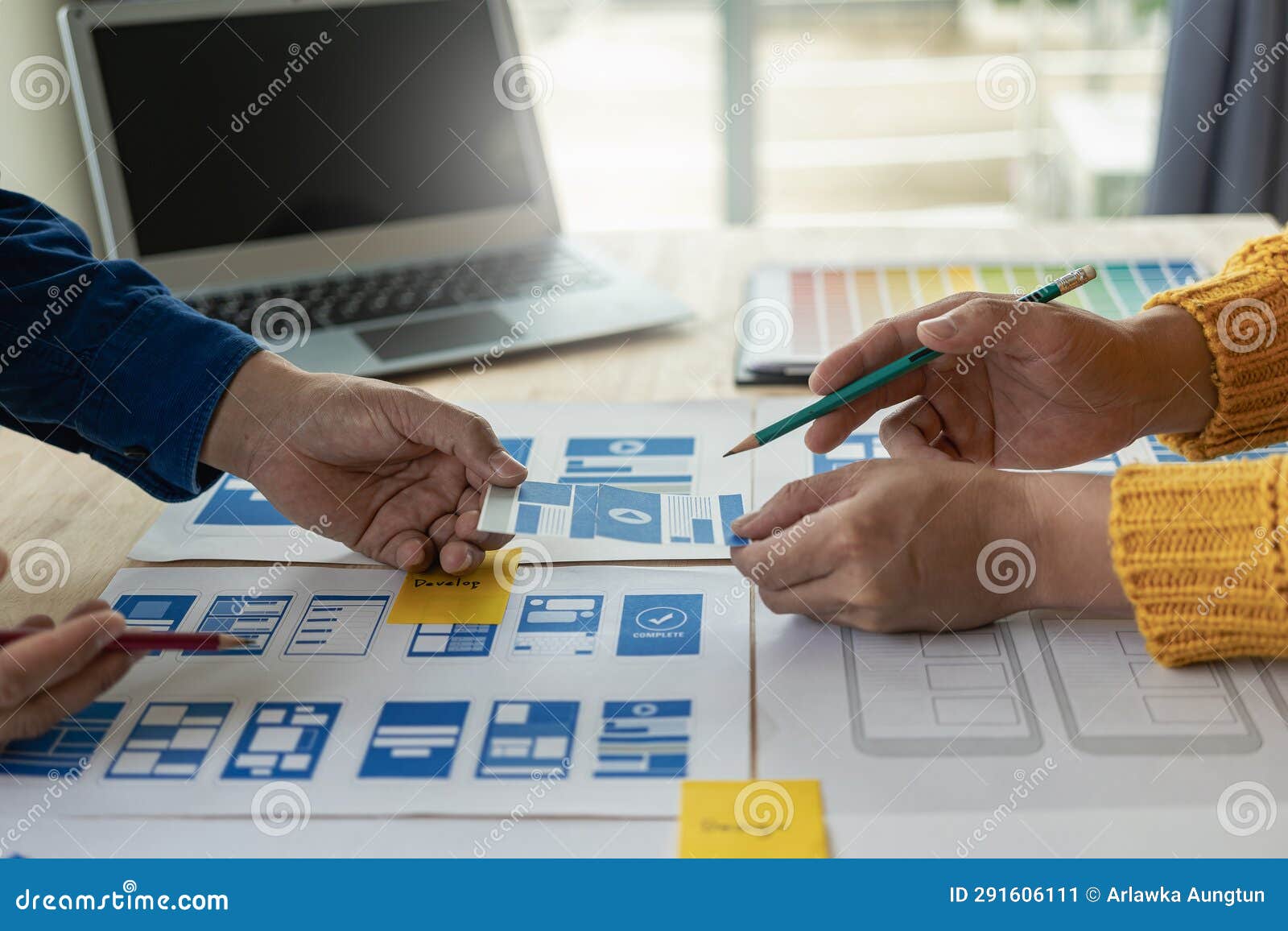 A Team of UI UX Web Designers is Working Together To Develop a Mobile ...