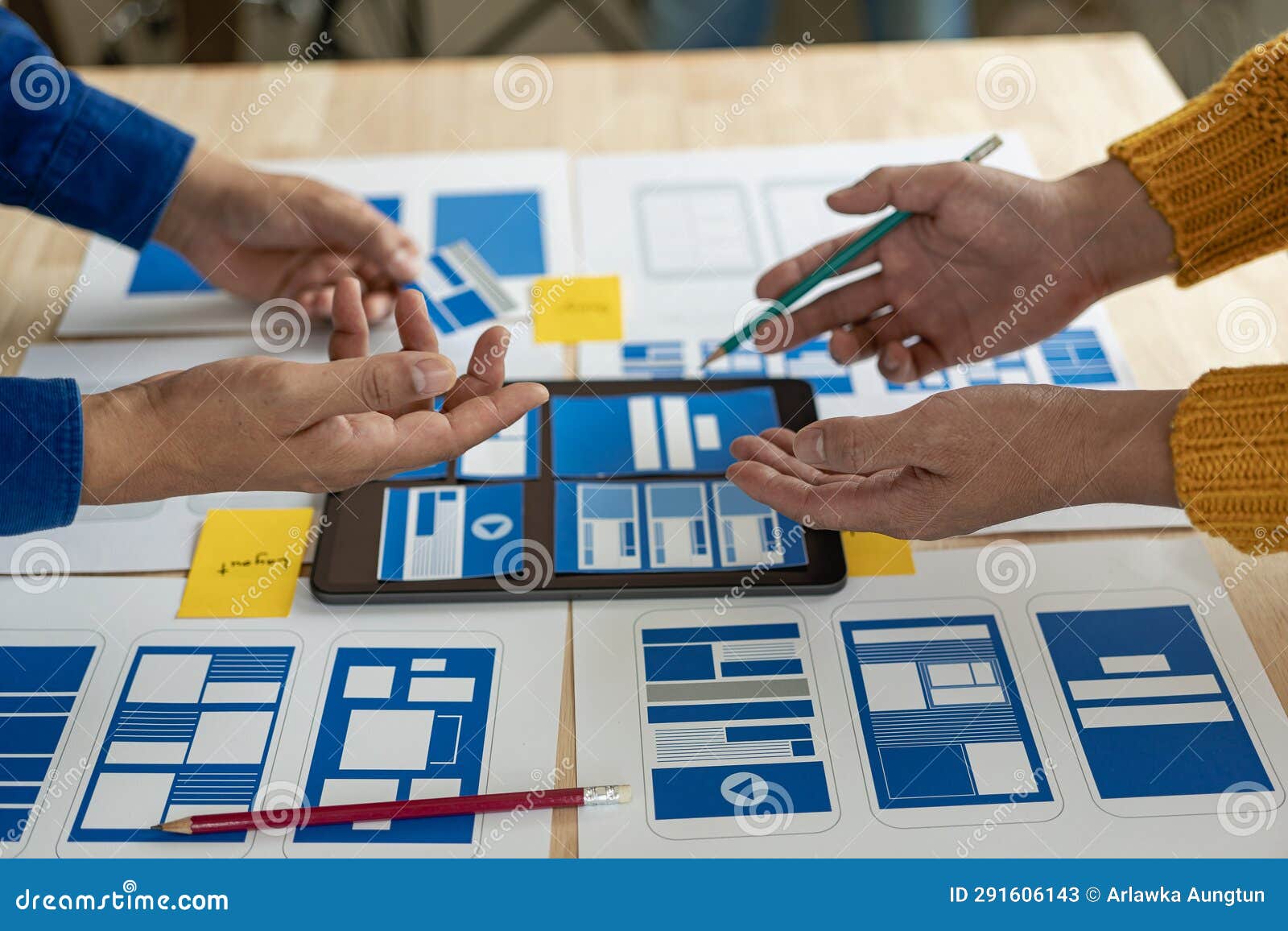 A Team of UI UX Web Designers is Working Together To Develop a Mobile ... A Team of UI UX Web Designers is Working Together To Develop a Mobile ...