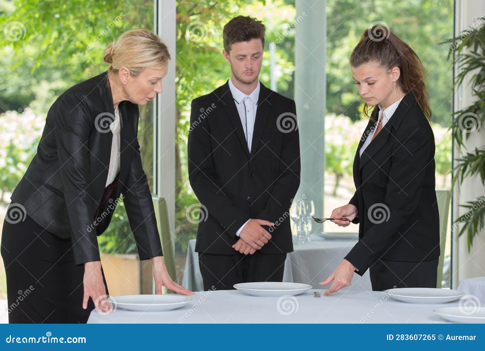 Team Waiters Setting Up Tables at Restaurant Stock Image - Image of ...