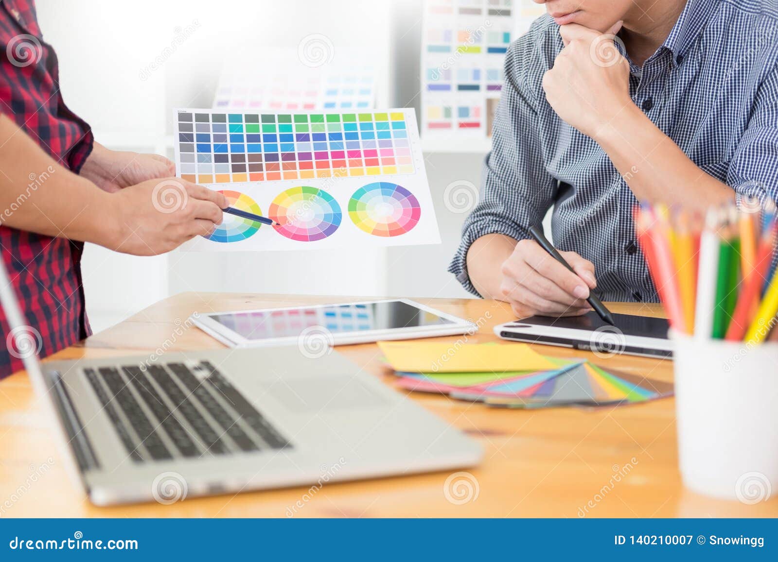 Team Web Designer Working Drawing Something on Graphic Computer in the ...