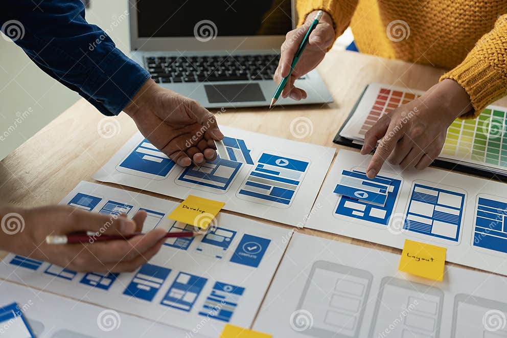 A Team of Web Designers with the Ux Ui System are Writing Programs and ...