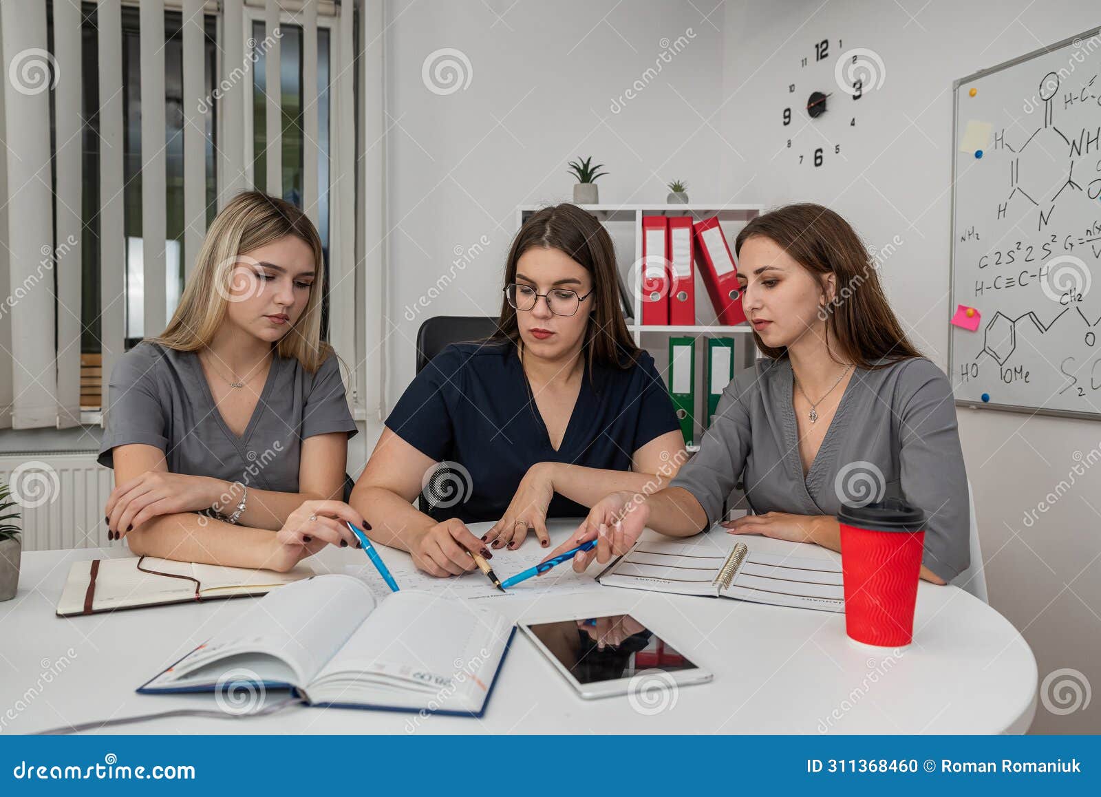 Team of Woman during Meeting in Office, Blackboard with Drawn Molecular ...