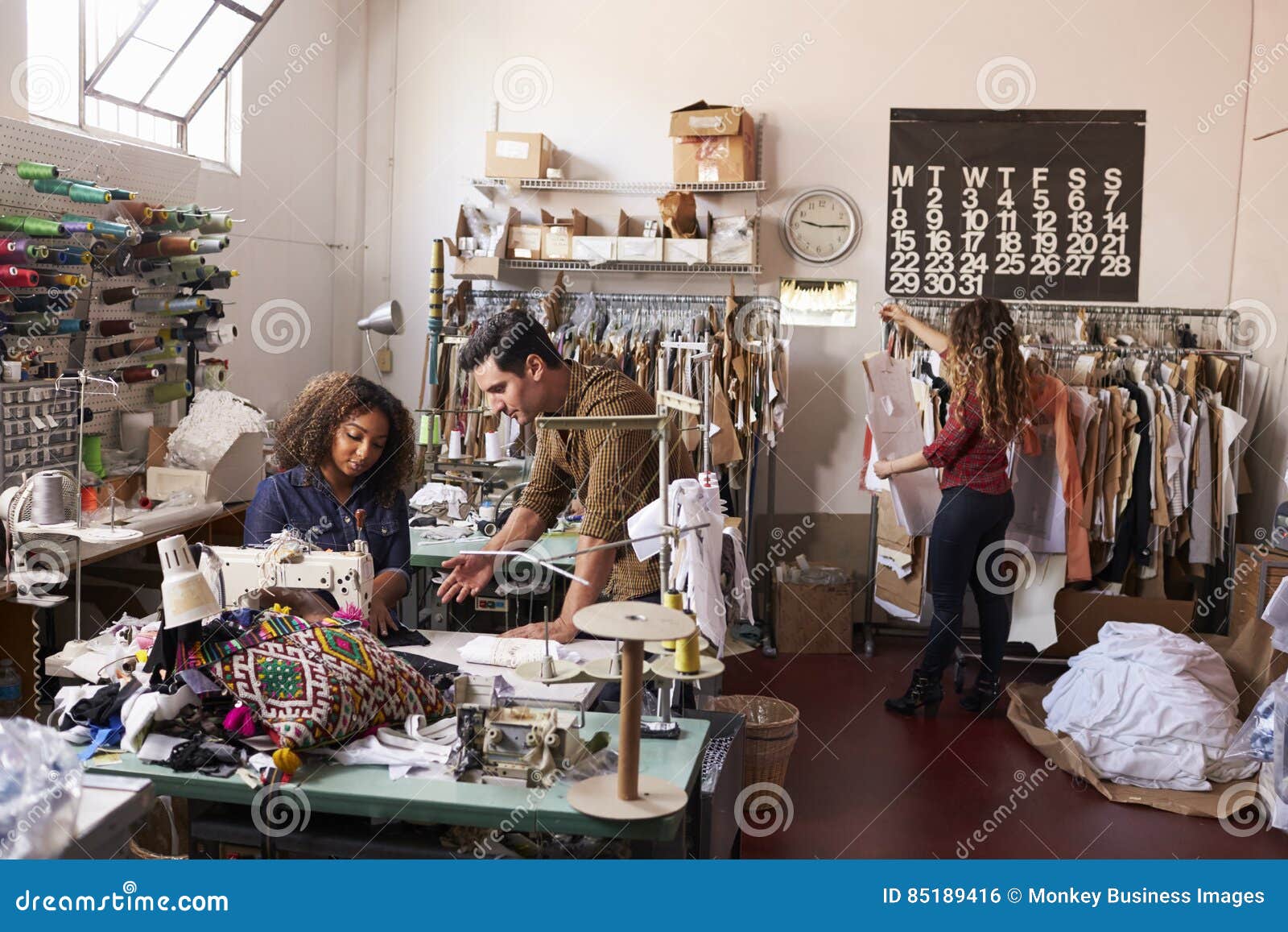 Team at Work at a Clothes Manufacturing Workshop Stock Photo - Image of ...