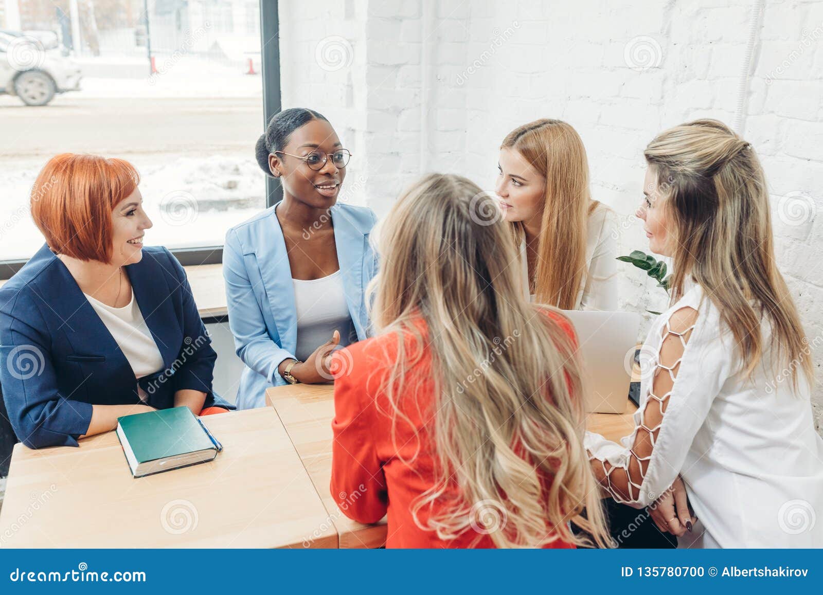Team Work Process. Multiracial Group of Women Coloborating in Open ...