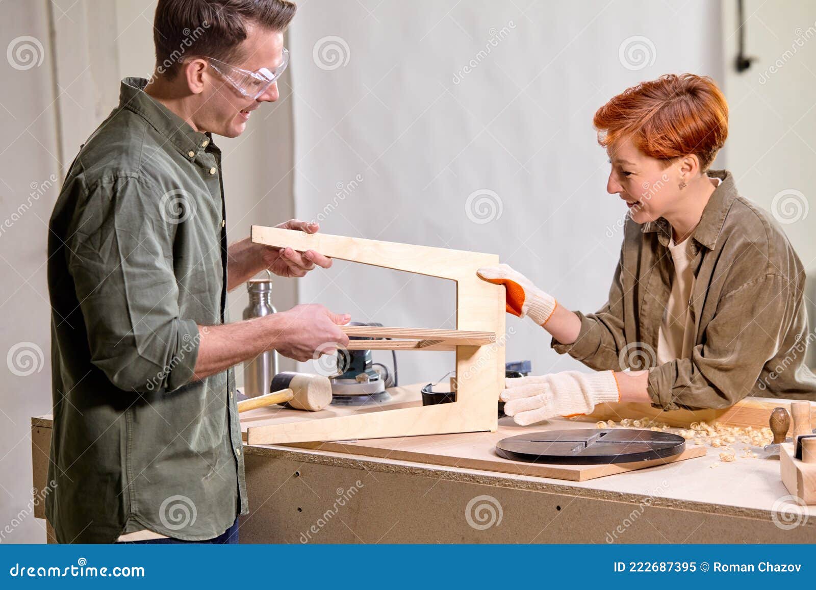 Team Work of Two Friendly Joiners Working in Workshop Together ...