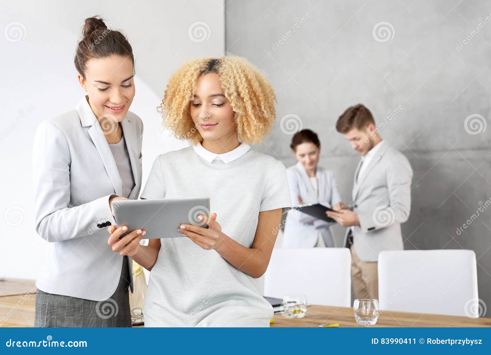 Team of Workers Preparing a Presentation Stock Image - Image of confer ...