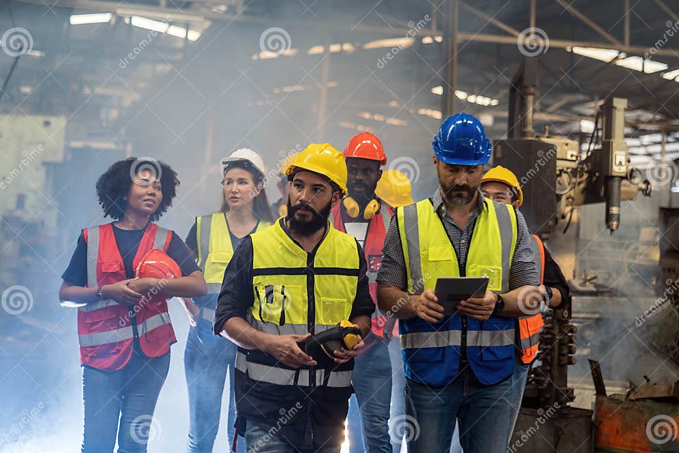 Team Workers and Workers are Standing in the Factory. Group Staff ...