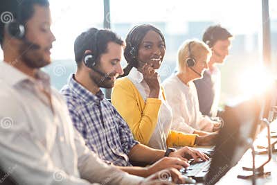 Team Working on Computer with Headset Stock Photo - Image of ...