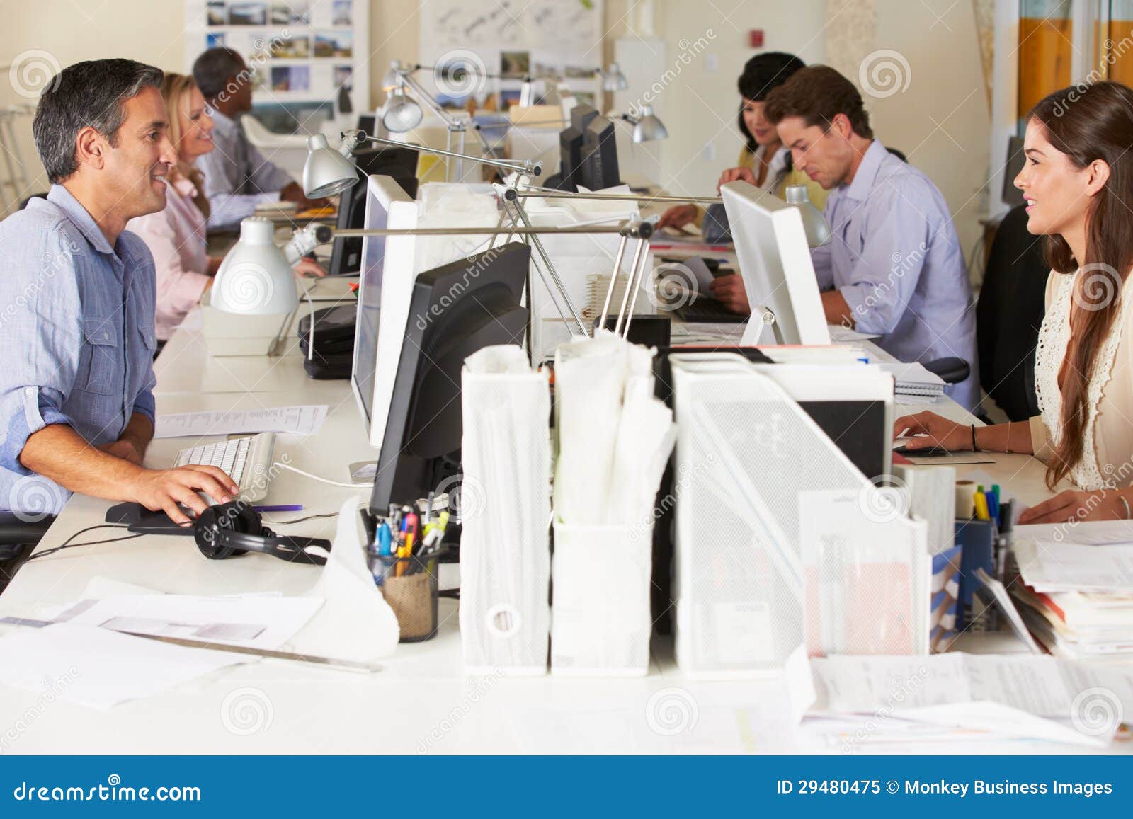 Team Working at Desks in Busy Office Stock Image - Image of industry ...