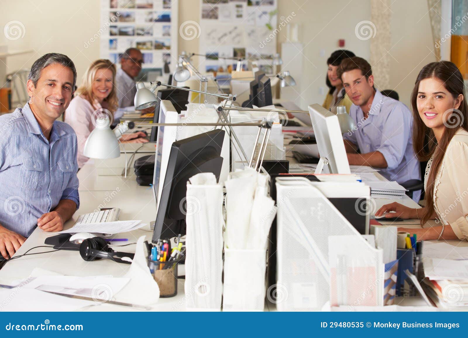 Team Working at Desks in Busy Office Stock Image - Image of industry ...