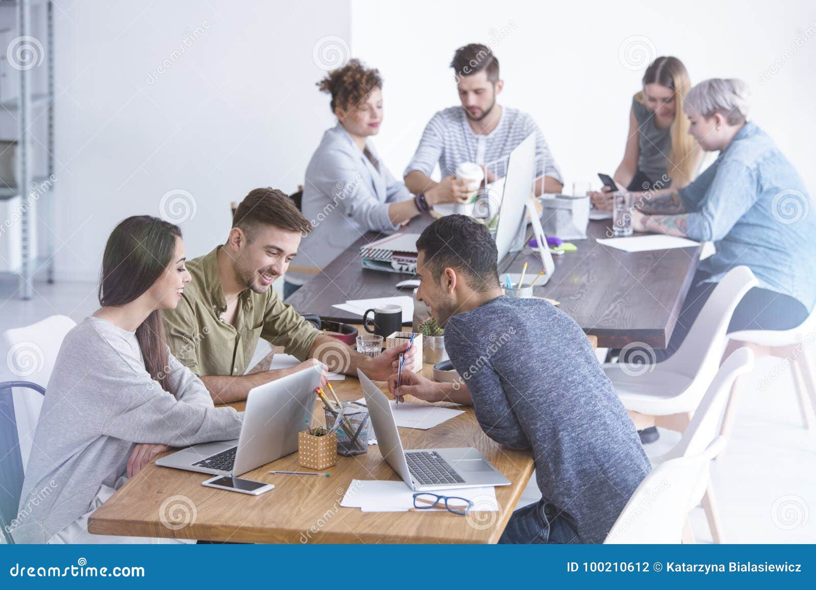 Team working on project stock photo. Image of friends - 100210612