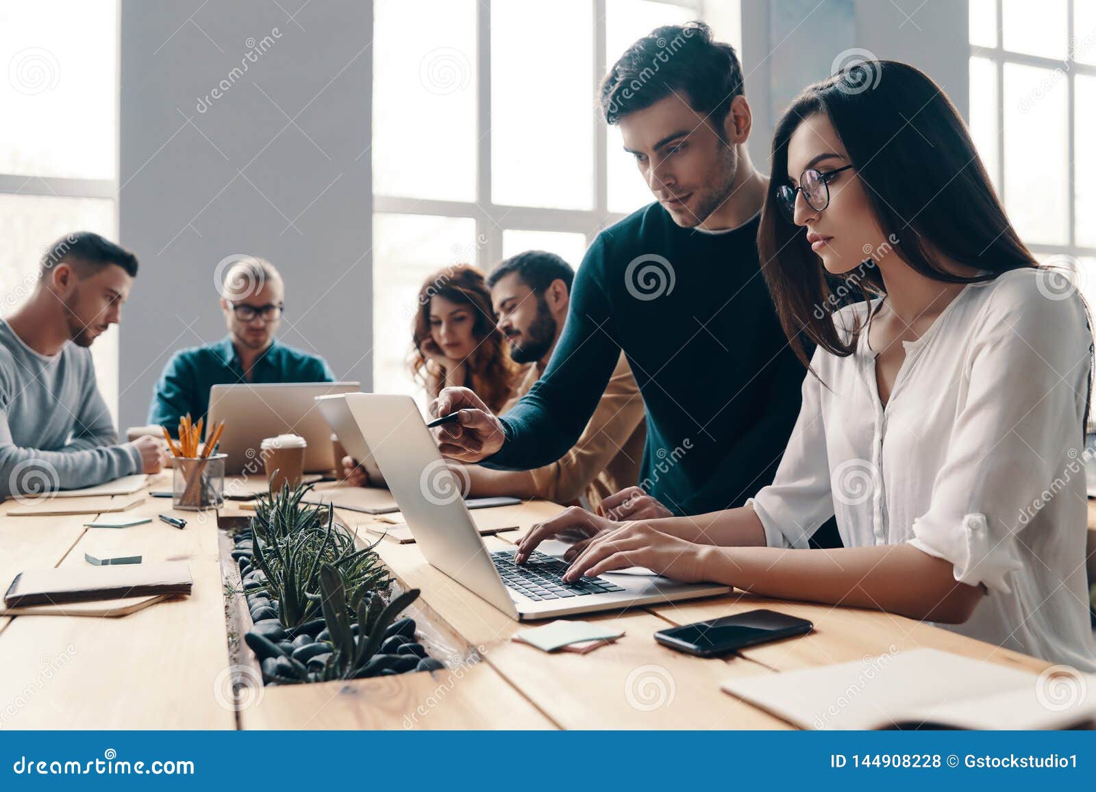 Team working together. stock photo. Image of planning - 144908228