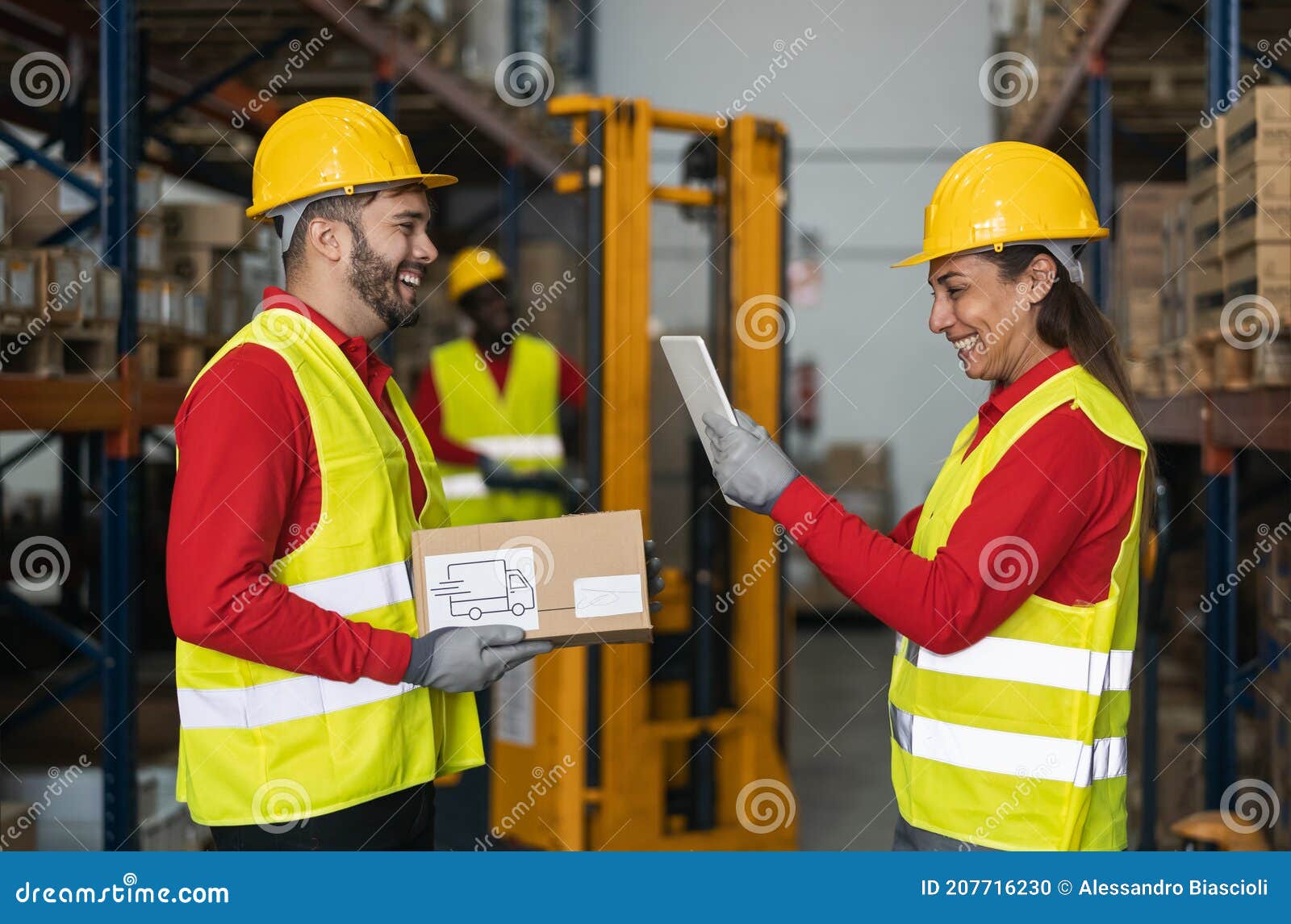 Team Working in Warehouse Doing Inventory Using Digital Tablet and ...