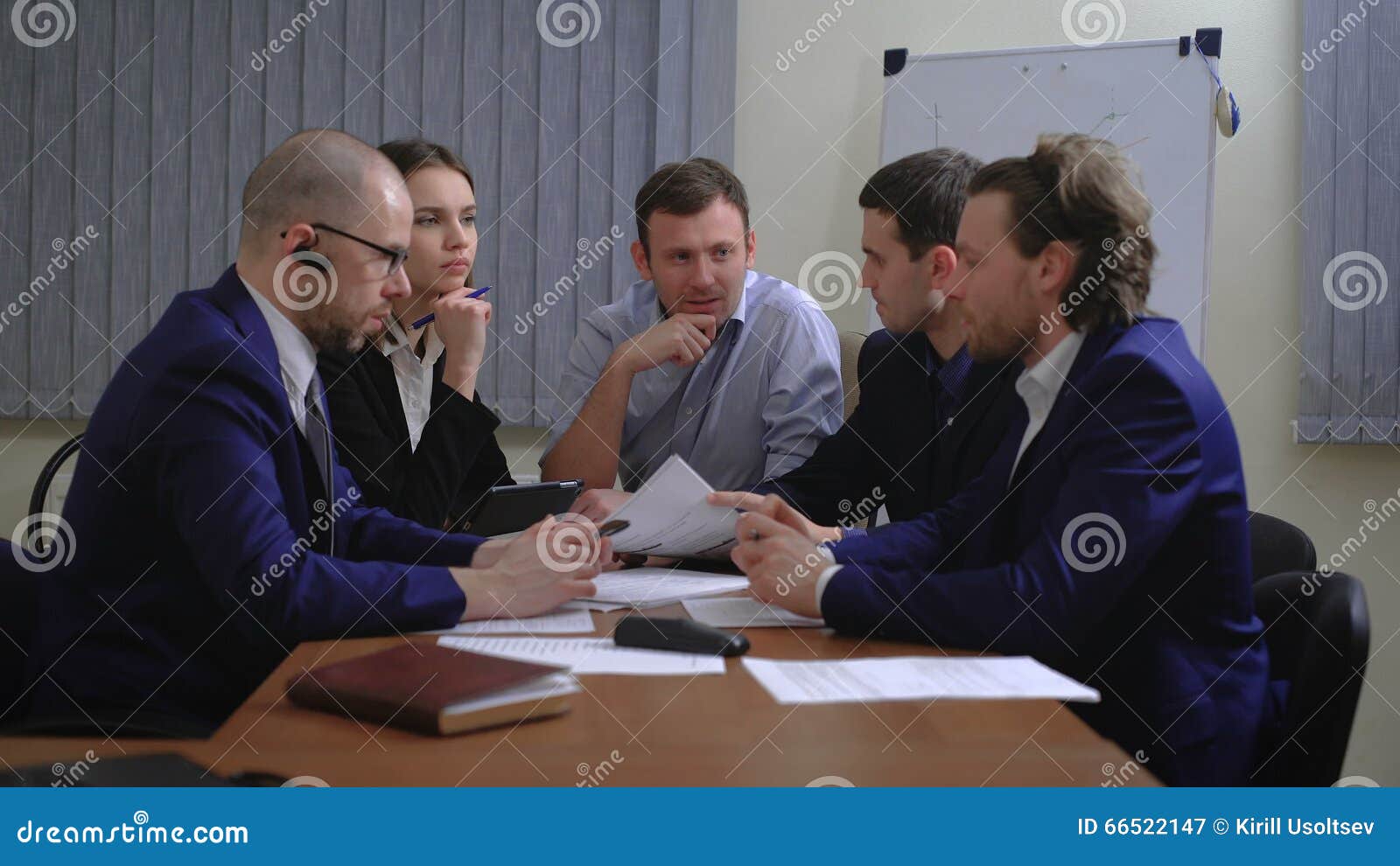 The Team of Young Businesspeople. they Work Together with the Documents ...