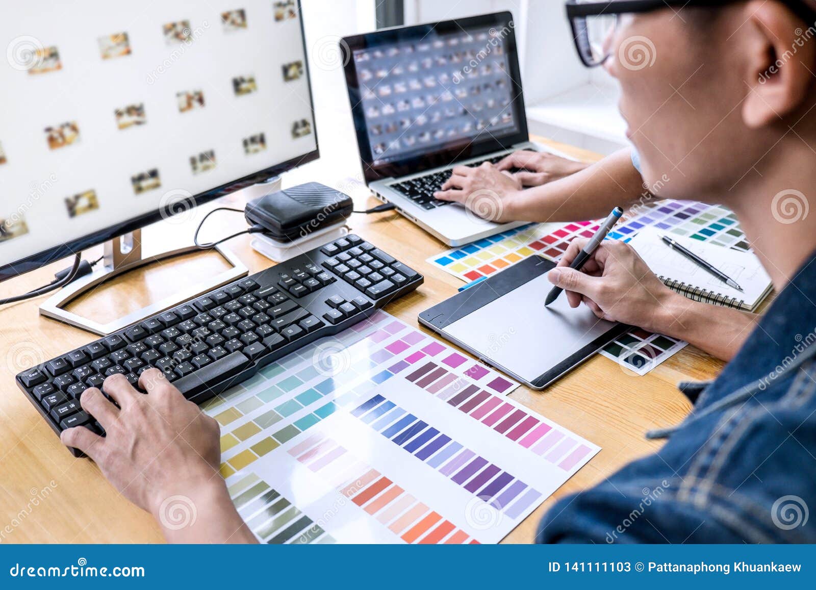 Team of Young Colleagues Creative Graphic Designer Working on Color ...