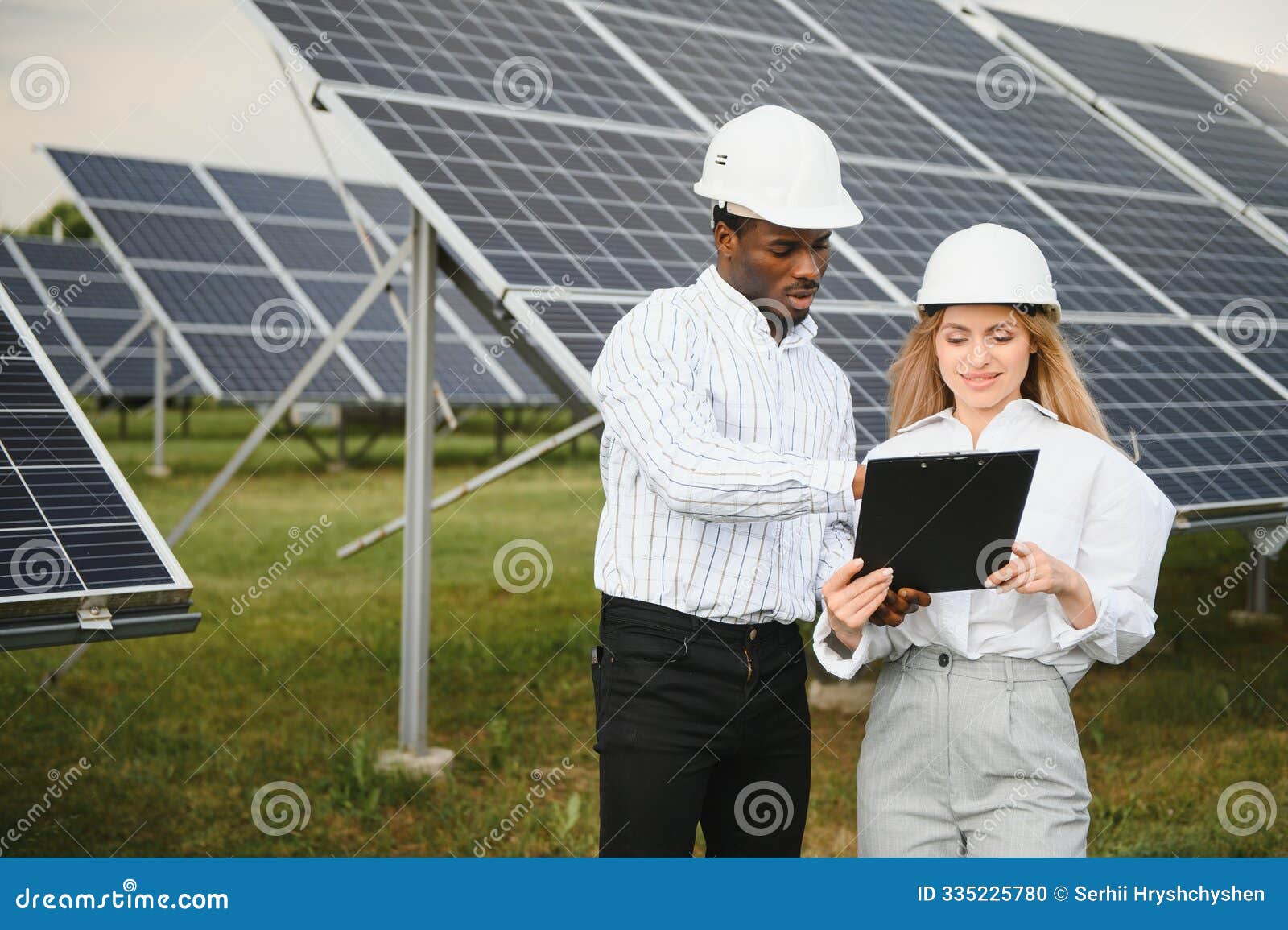 Team of Young Engineers on a Solar Farm Stock Photo - Image of water ...