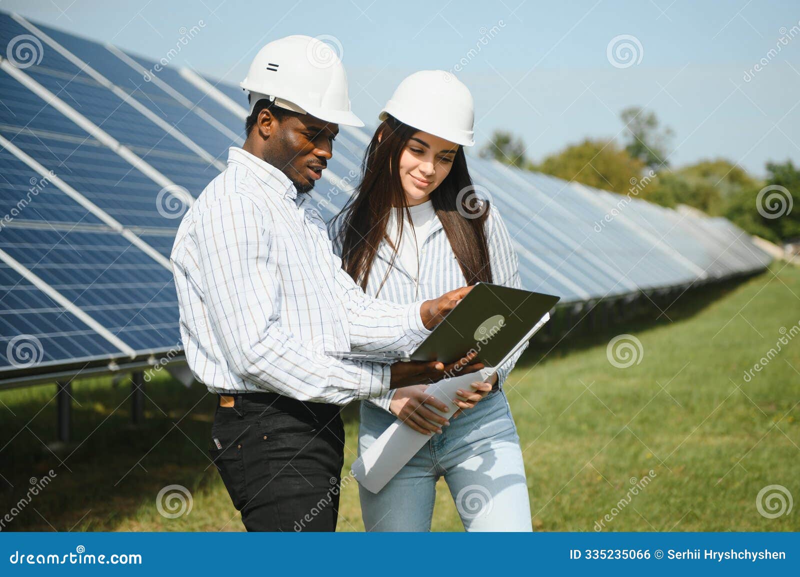 Team of Young Engineers on a Solar Farm Stock Photo - Image of male ...