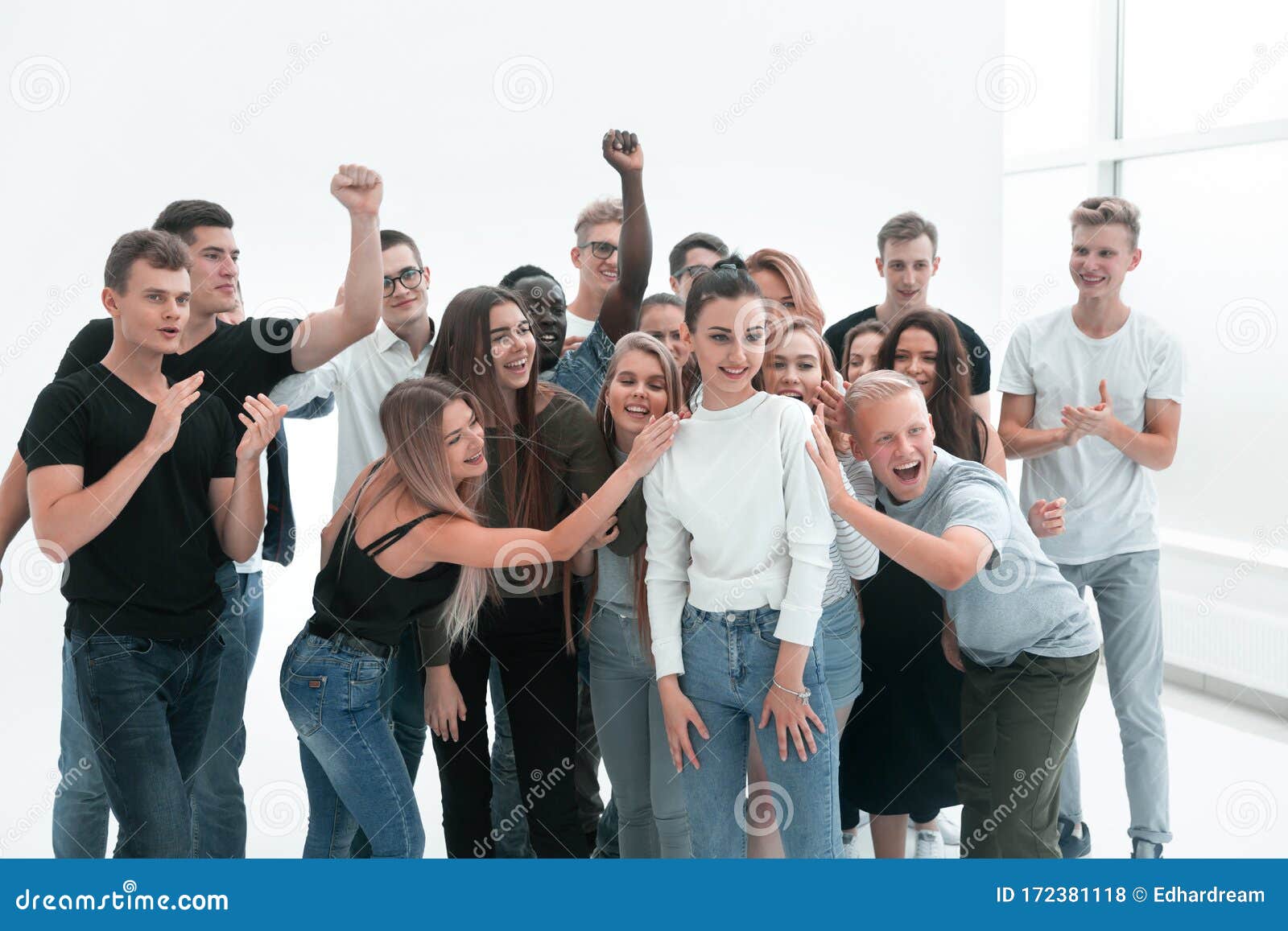 Team of Young People Supporting Their Comrade Stock Photo - Image of ...