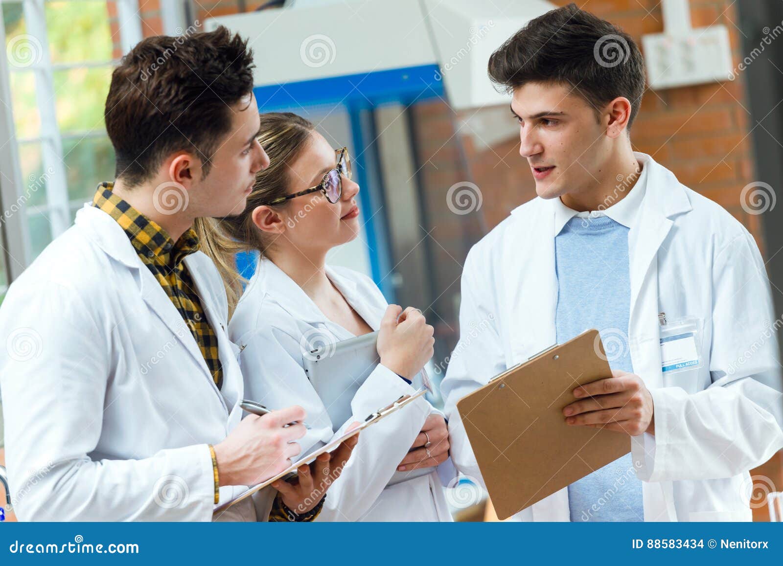 Team of Young Professional Scientists Working in Laboratory. Stock ...