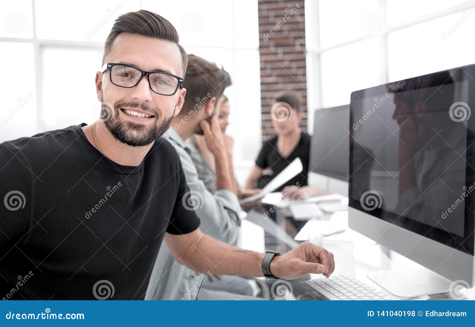 Team Young Professionals Having Casual Discussion in Office Stock Photo ...