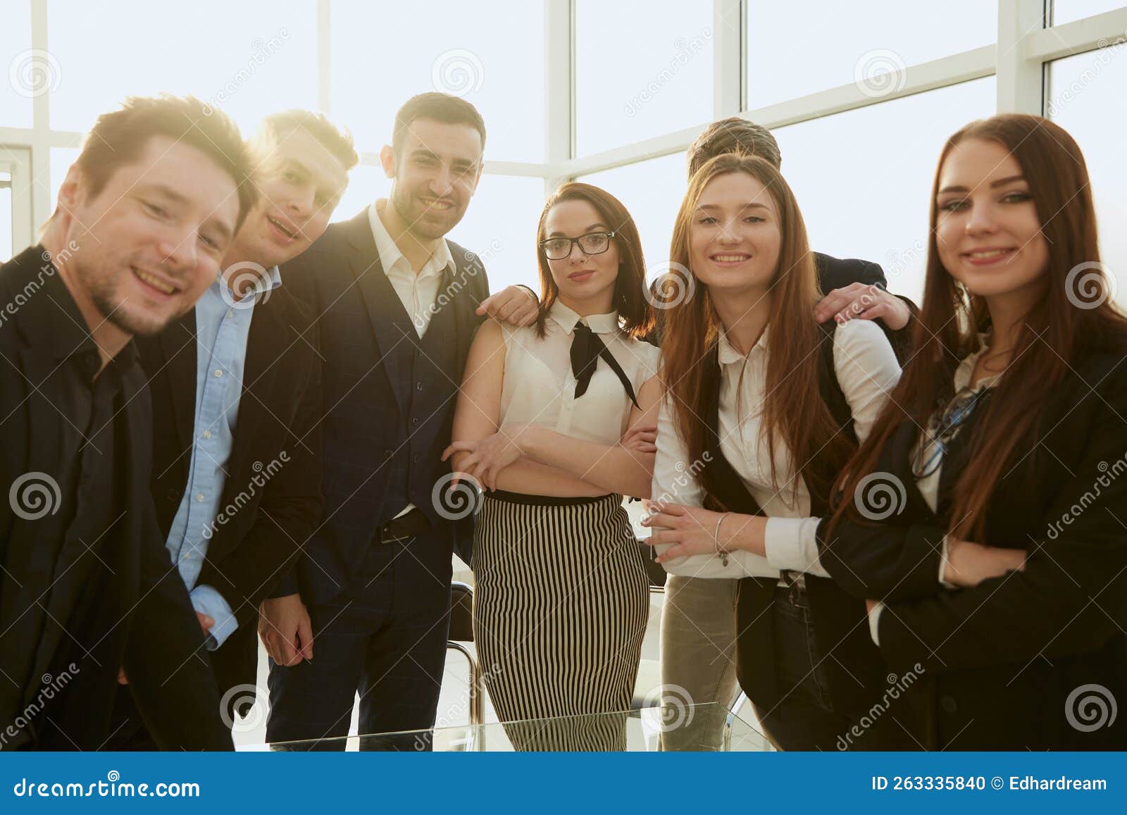Team of Young Professionals Standing in the Office. Stock Photo - Image ...