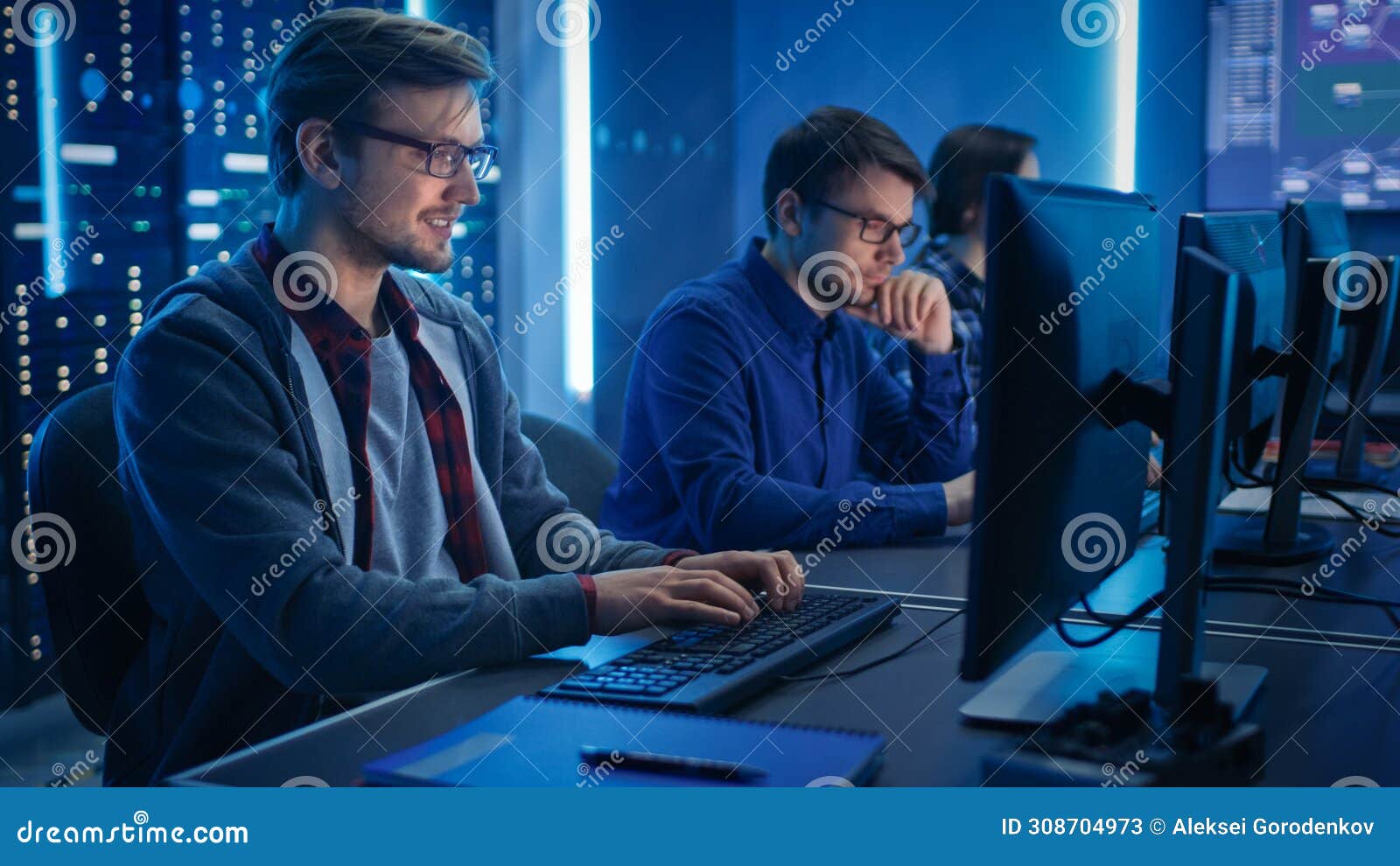 Team of Young it Programers Working on Desktop Computers in Data Center ...