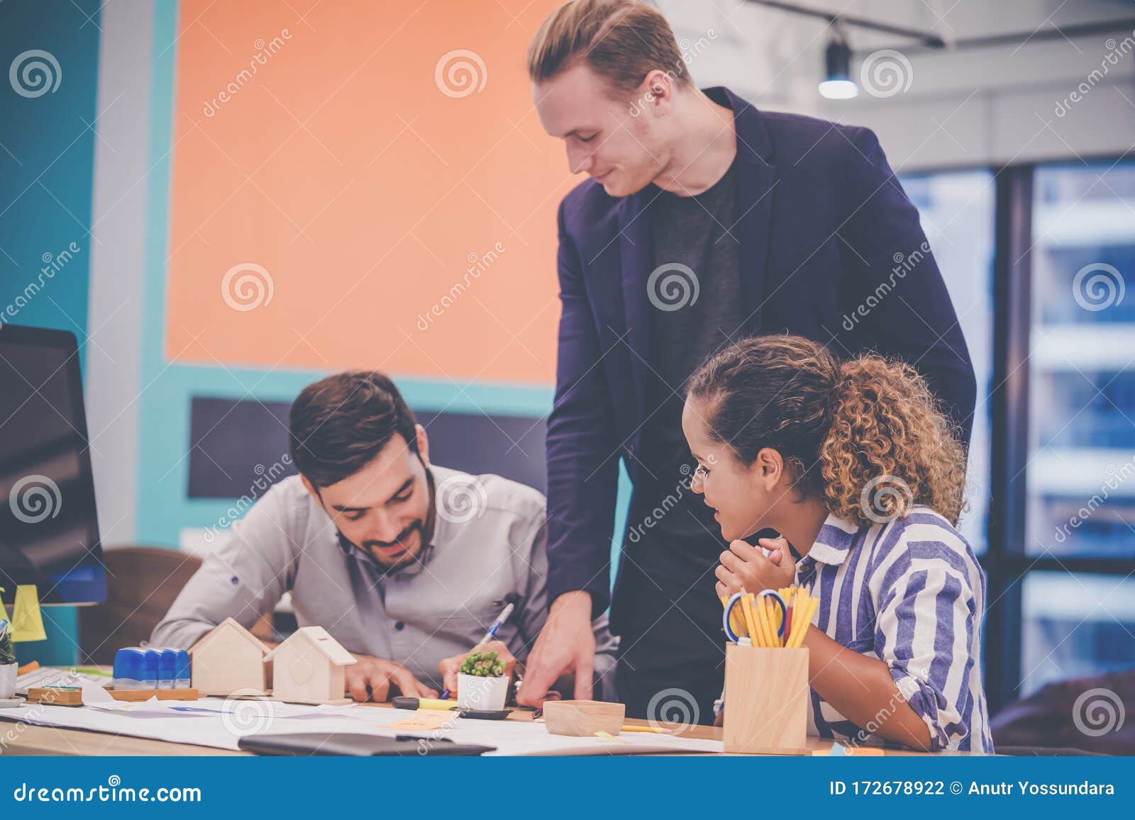 Team of Young Real Estate Contractor Brainstorming in Office Stock ...