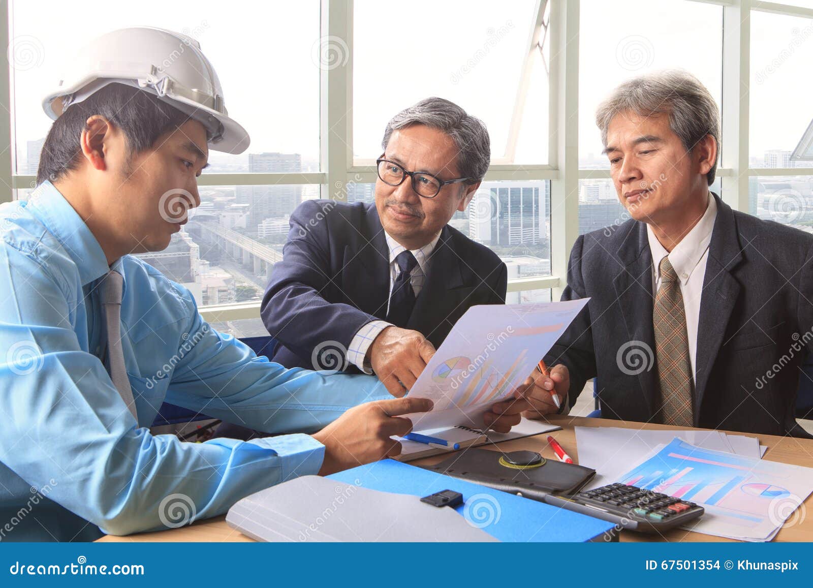 Team of Young and Senior Engineering Man Project Meeting in Work Stock ...