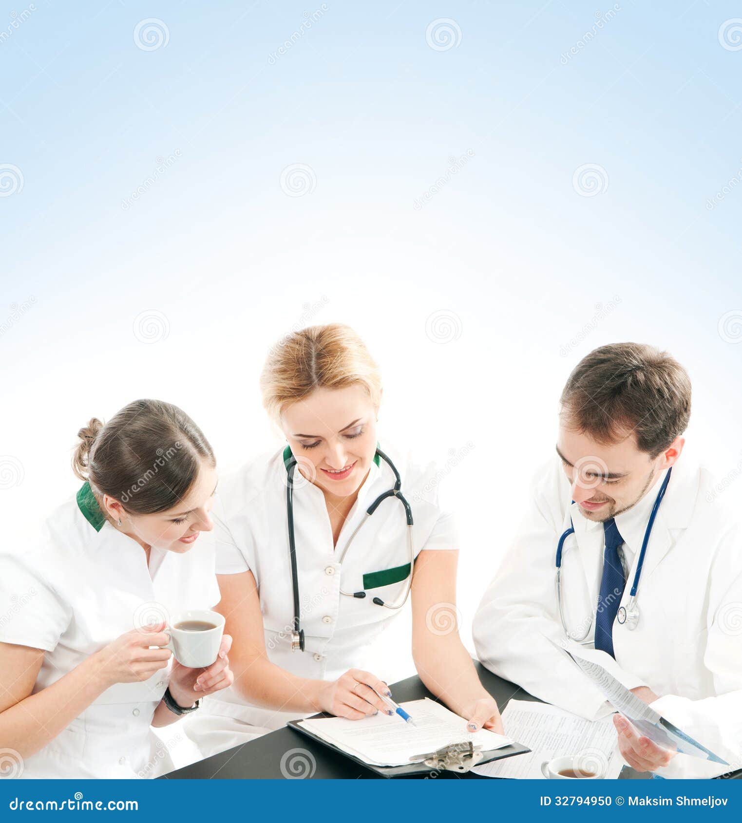 A Team of Young and Smart Doctors Working Together Stock Photo - Image ...