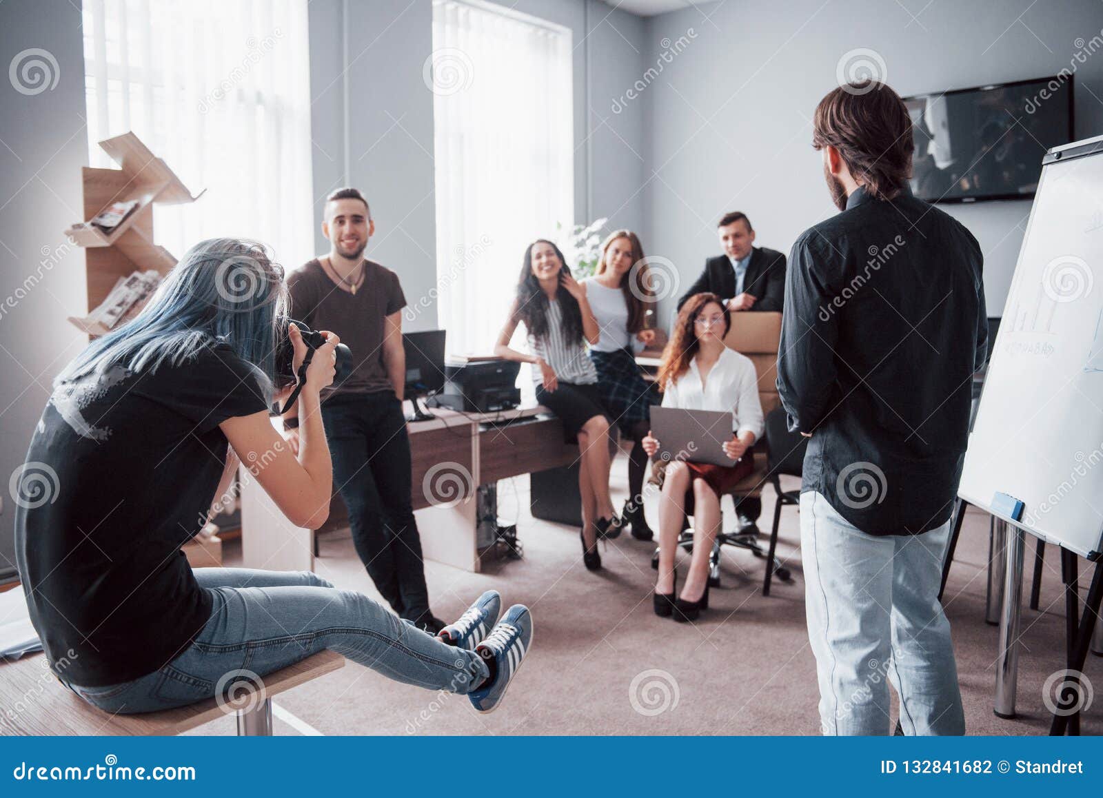 A Team of Young Students in the Office are Photographed. Stock Photo ...