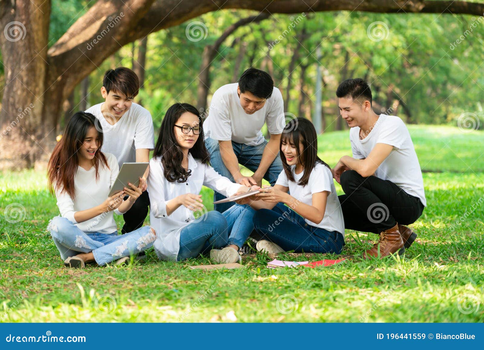 Team of Young Students Studying in the Park. Stock Image - Image of ...