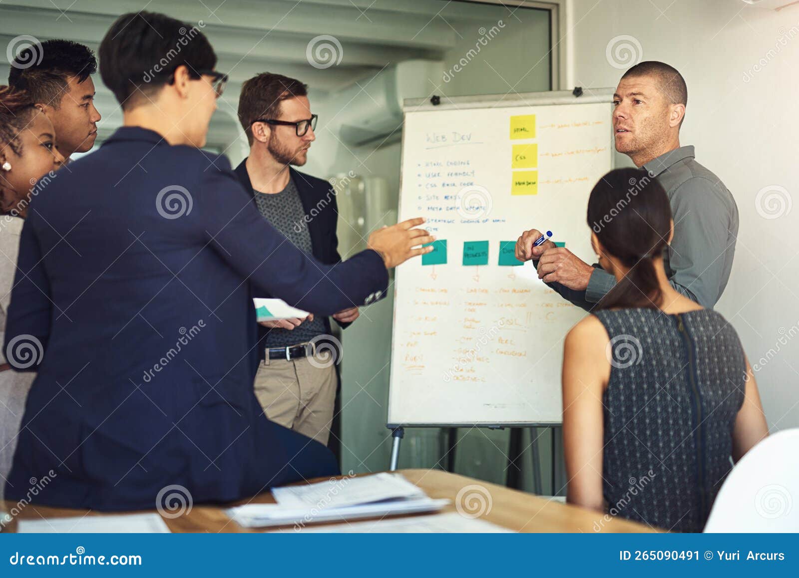 The Teams Input is Essential. a Group of Colleagues Having a Meeting ...