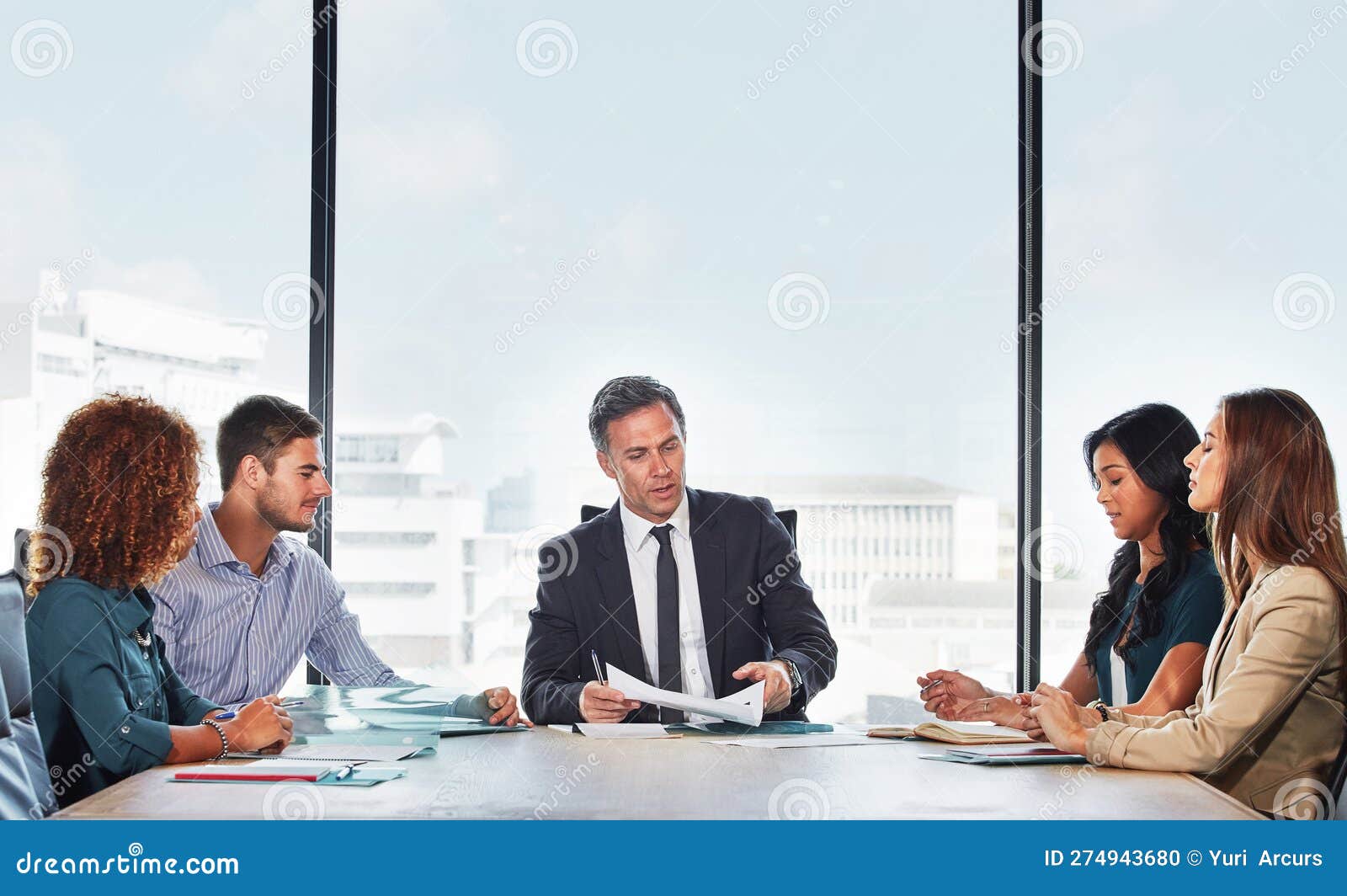 The Teams Talking Strategy. a Group of Businesspeople in a Meeting ...