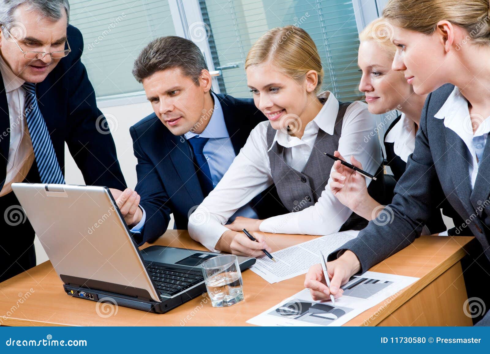 Teamwork stock photo. Image of holding, laptop, busy - 11730580