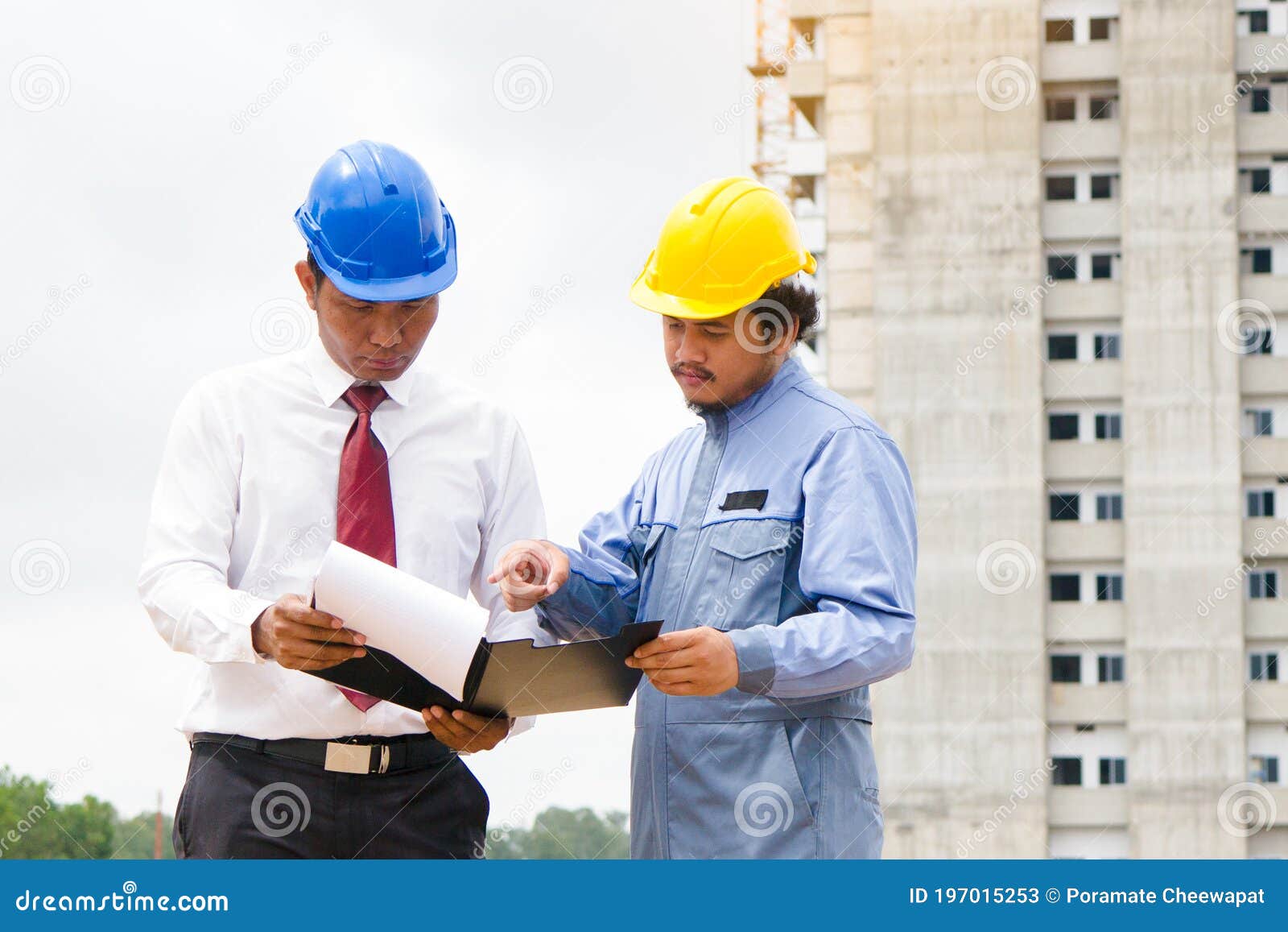 Teamwork of Asian Builder Concept. Contractor and Engineer Discussing ...